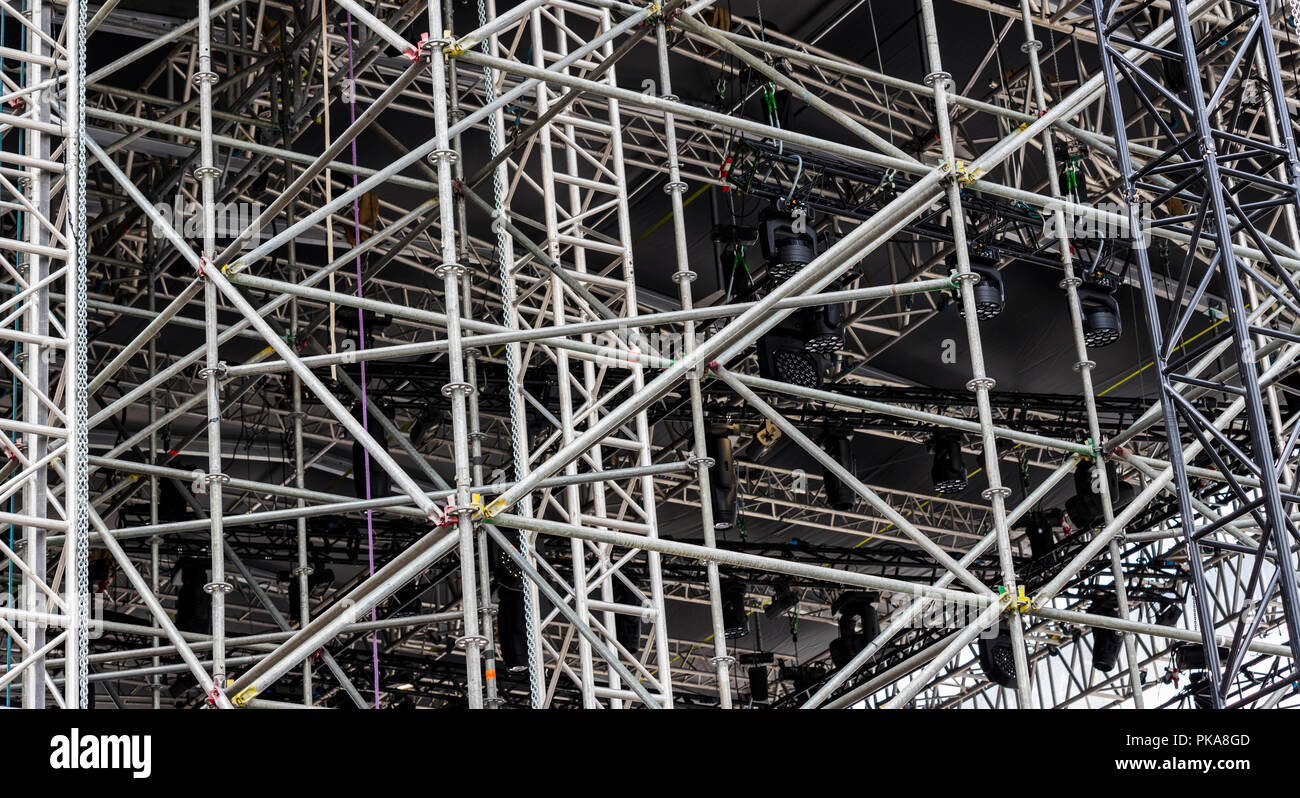 Background of metal construction of a portable concert stage with ...