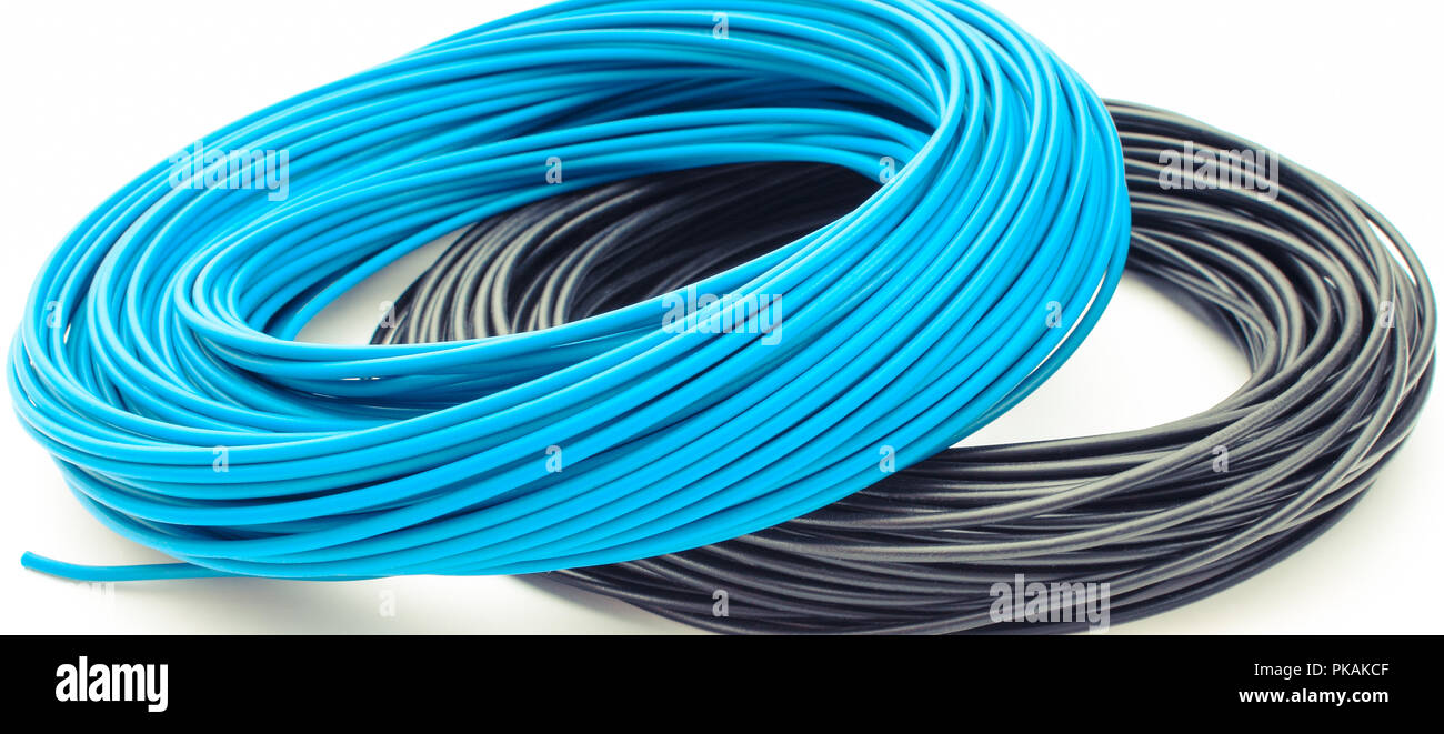 Blue and black cables on white background, electrical components for ...
