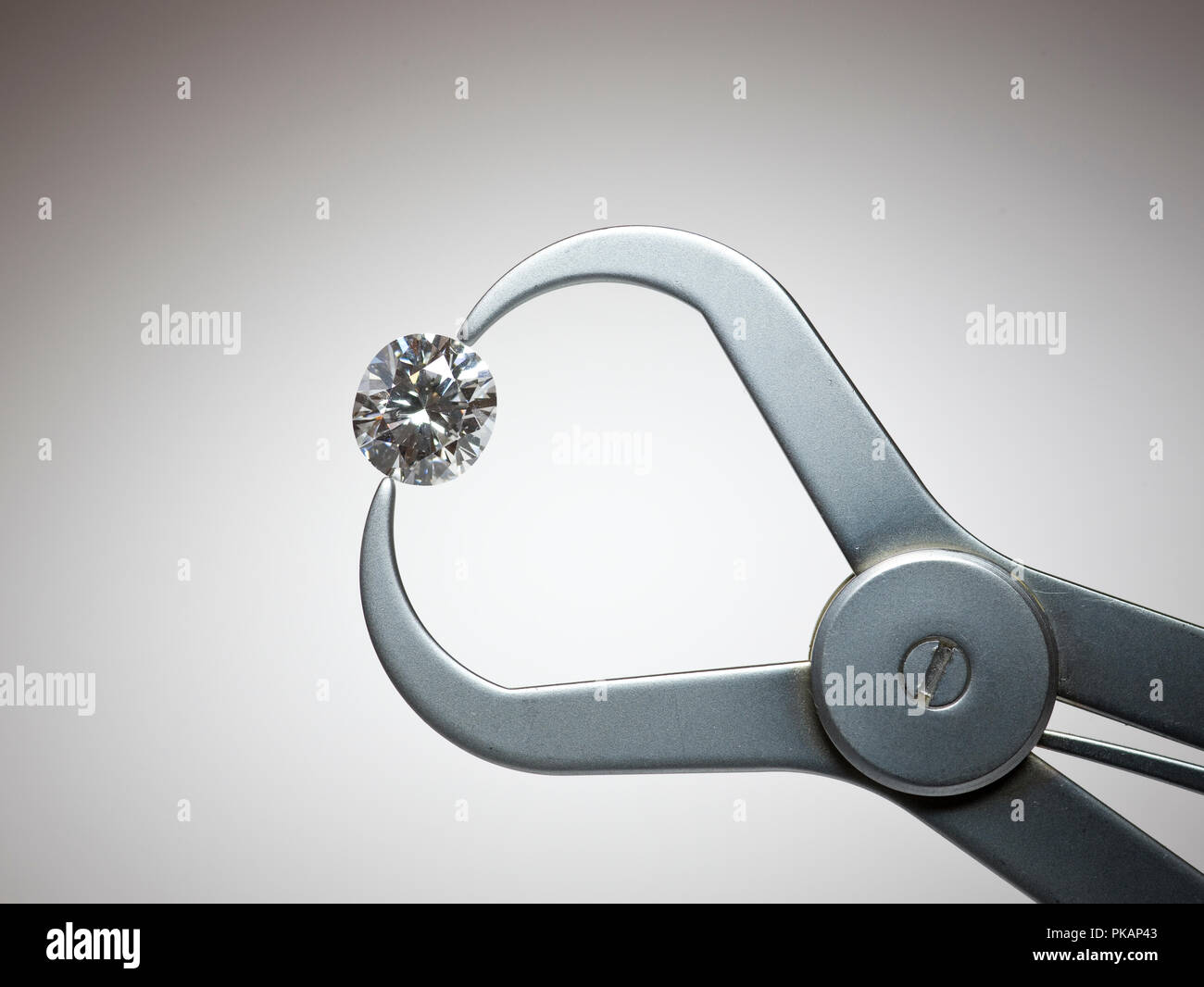 measuring precious stone , diamonds Stock Photo - Alamy