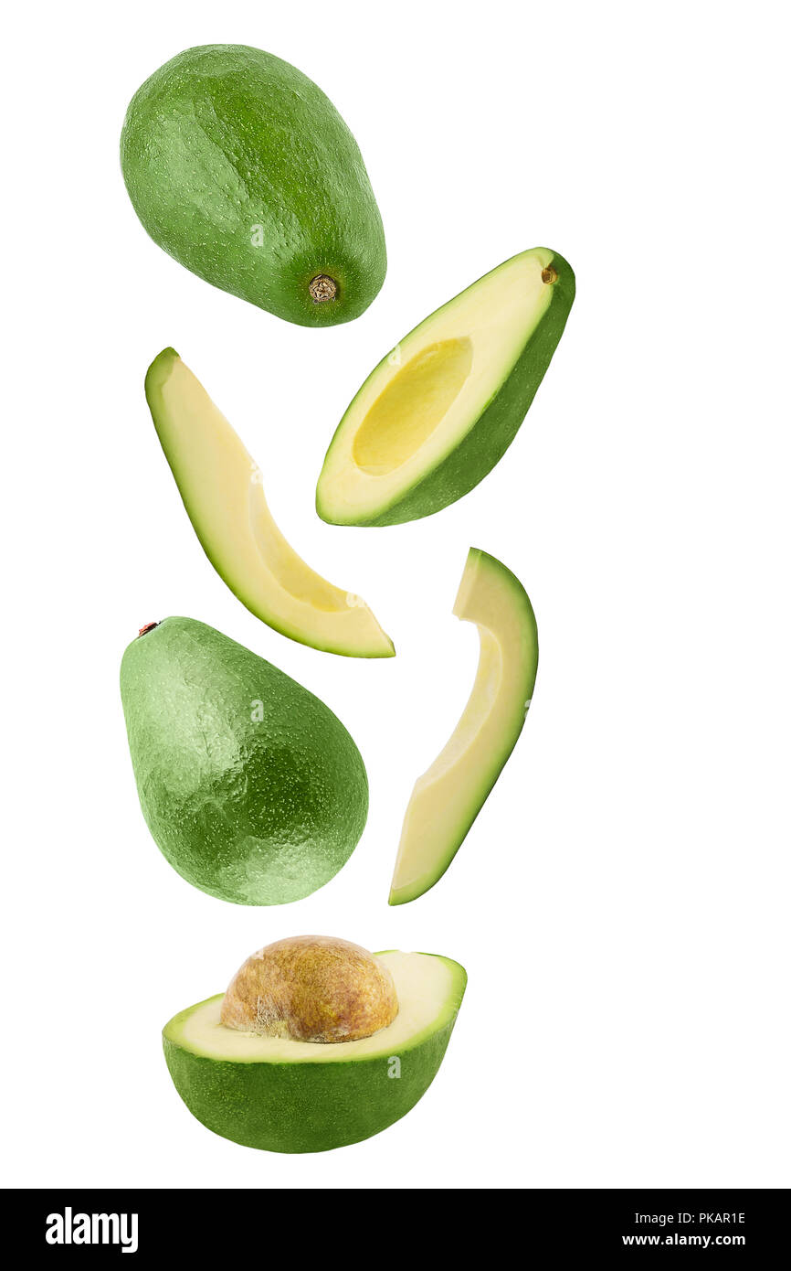 Isolated flying avocado. Falling fresh avocado isolated on white ...