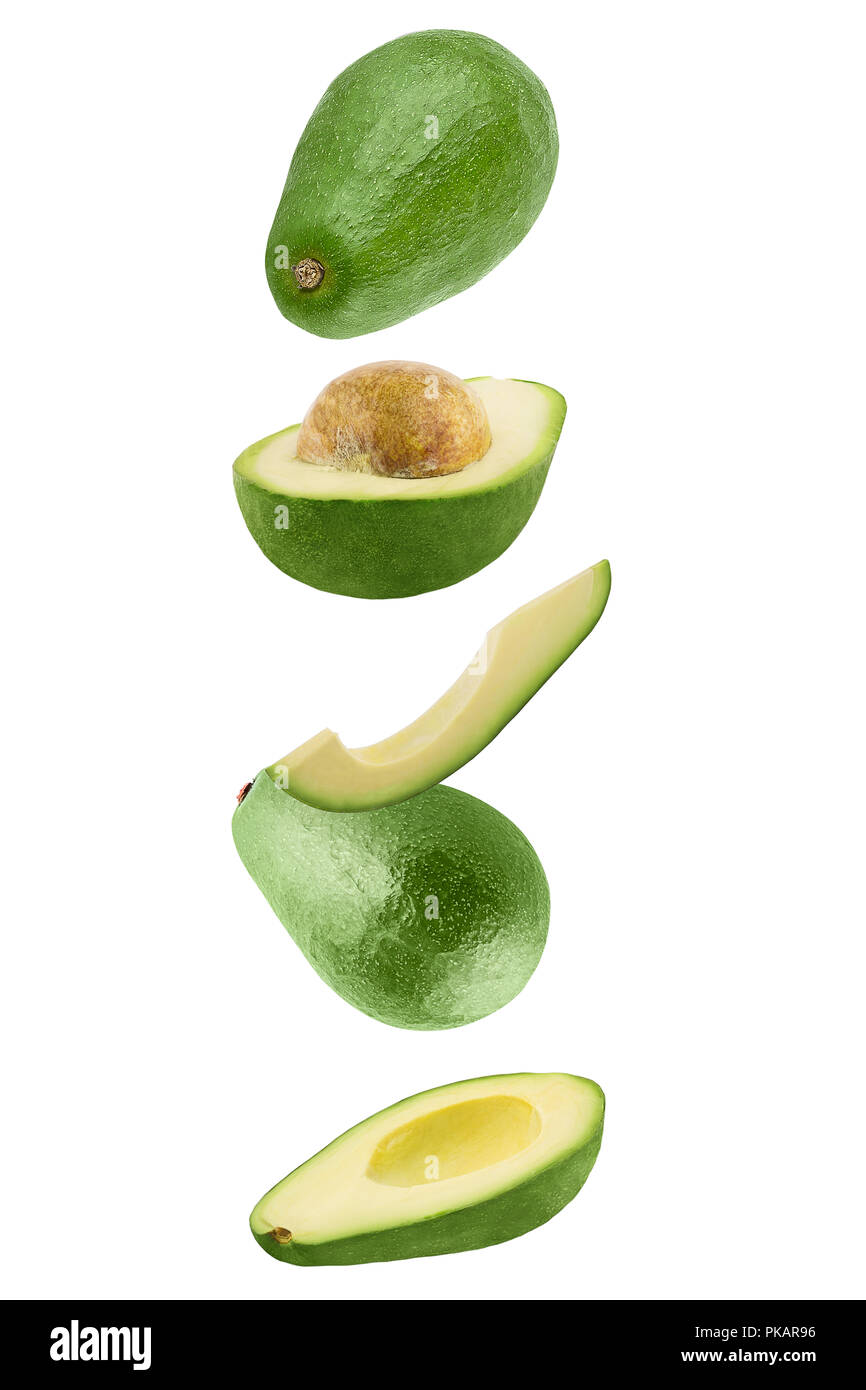 Isolated flying avocado. Falling fresh avocado isolated on white ...