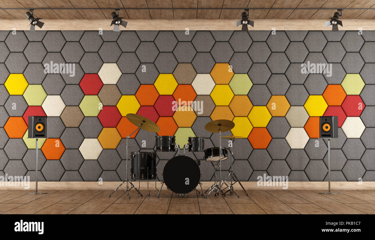 Black drums in a recording studio with colorful acoustic panel and ...