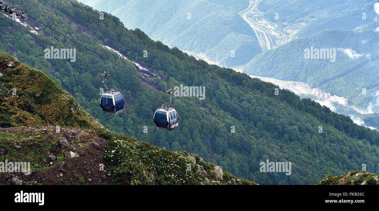 aerial tramway with cabins in the mountains Stock Photo - Alamy