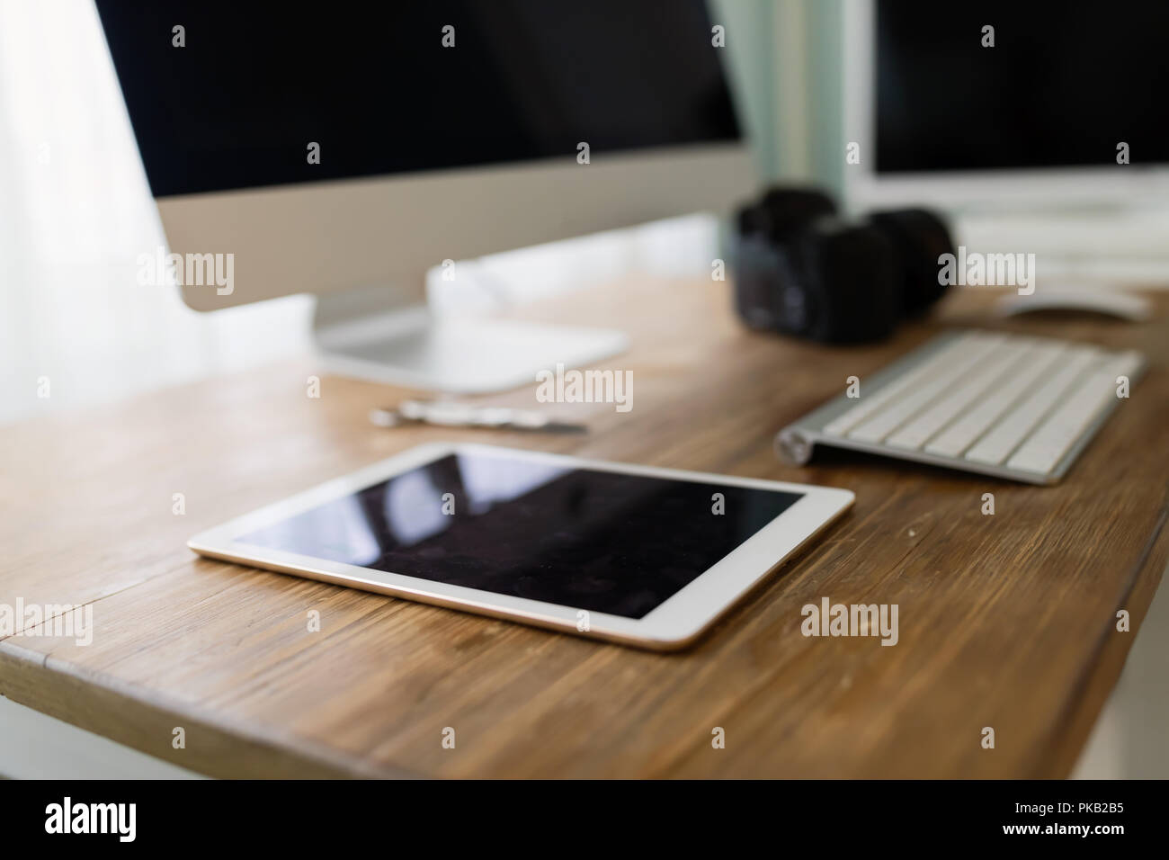Picture of office desk with tablet computer and other accessories Stock ...