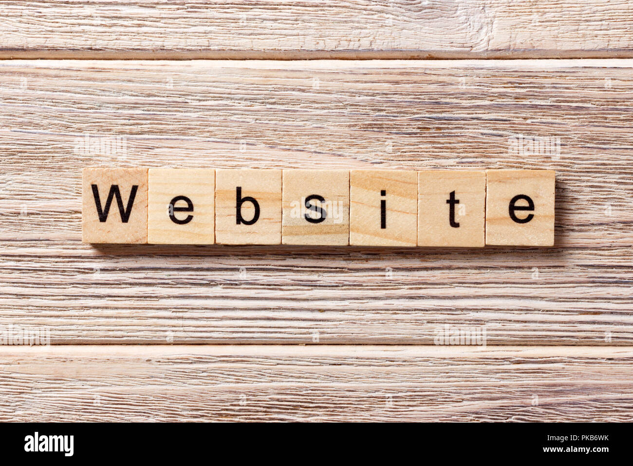 Website word written on wood block. Website text on table, concept ...