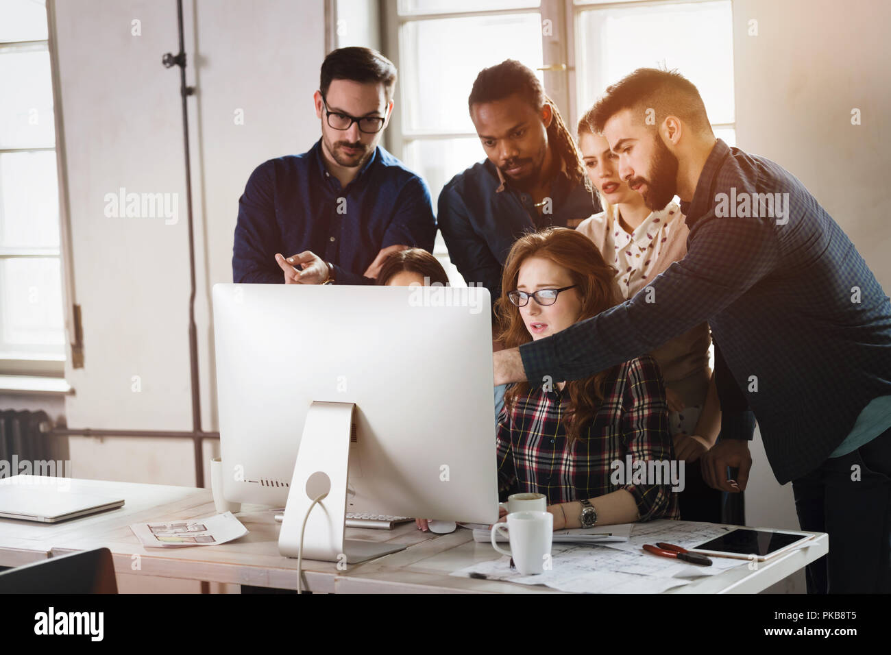 Diverse group students working together hi-res stock photography and ...