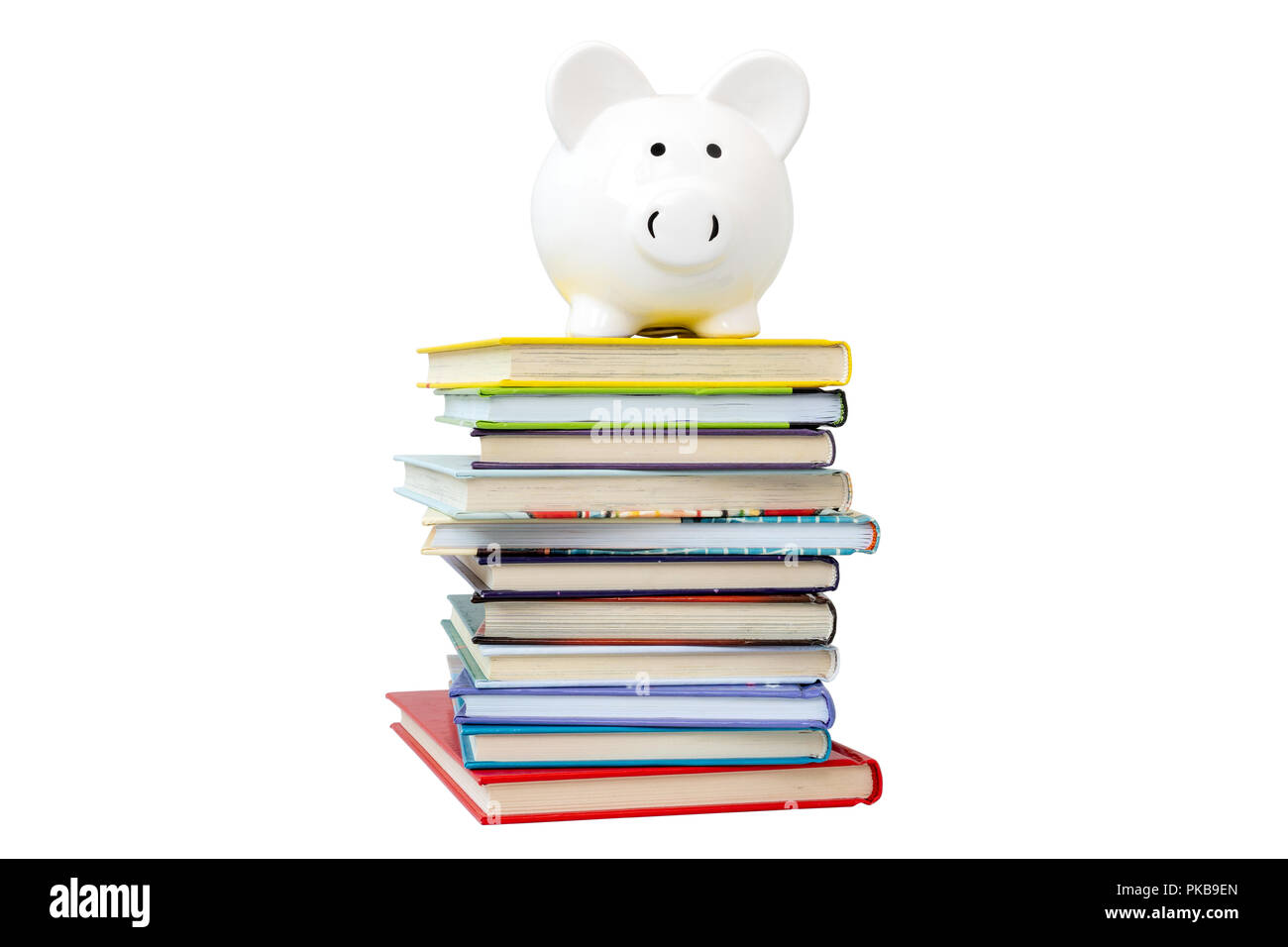 Piggy bank on a stack of books, isolated on white background Stock ...