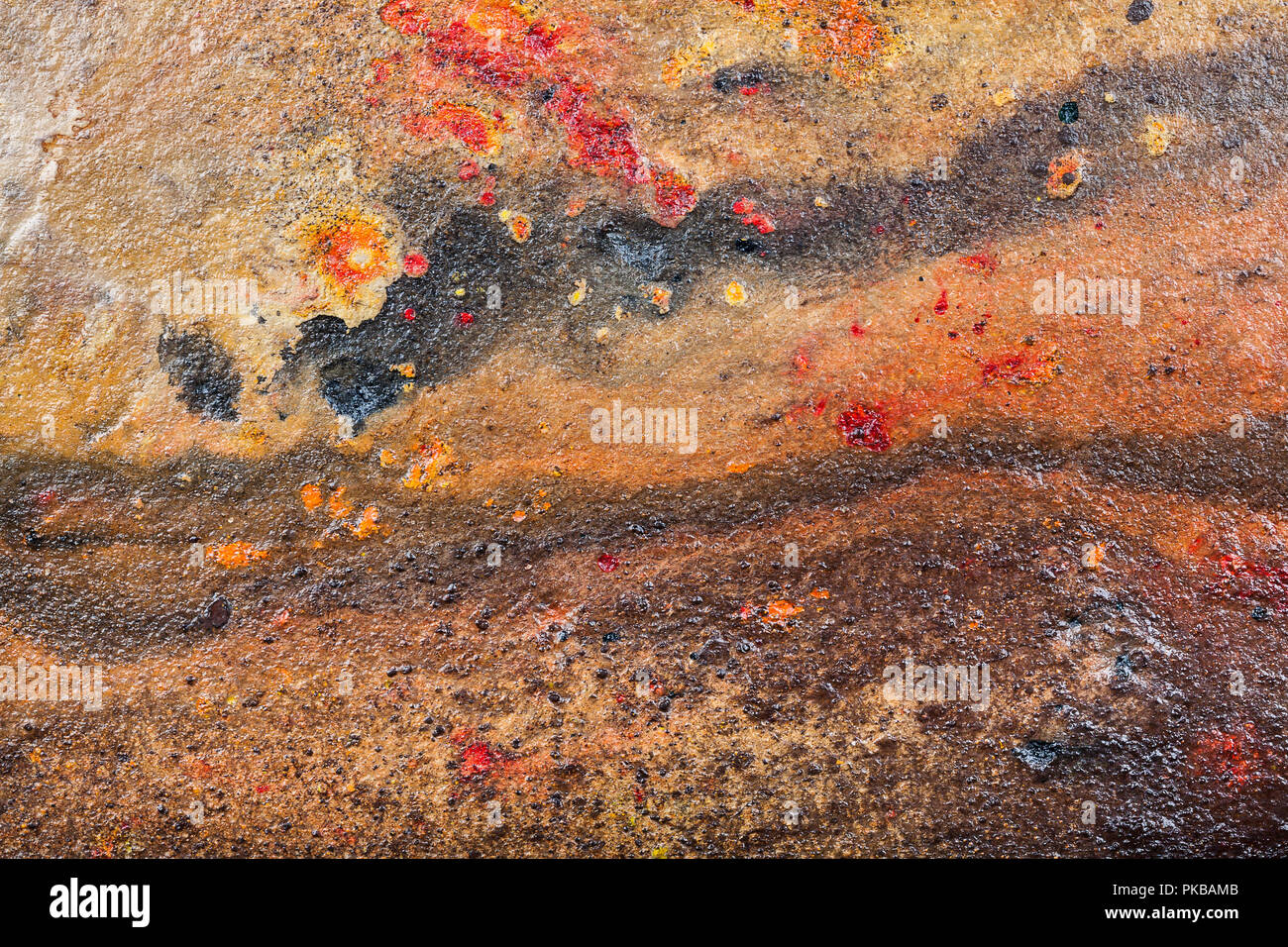 Yellow brown and red messy wall stucco texture background. Decorative ...