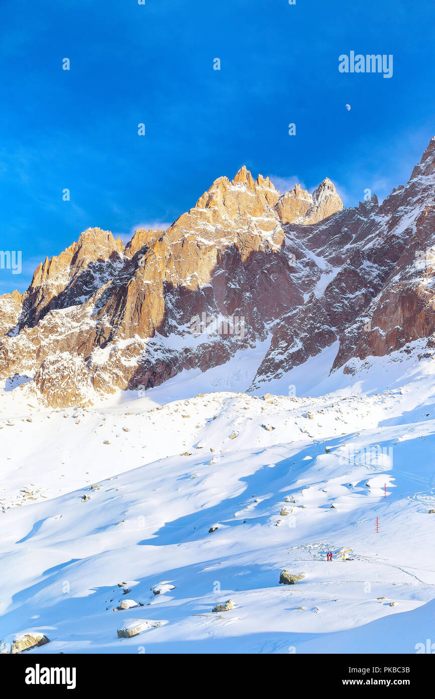 Winter snow mountains rocks in French Alps, Chamonix before sunset ...