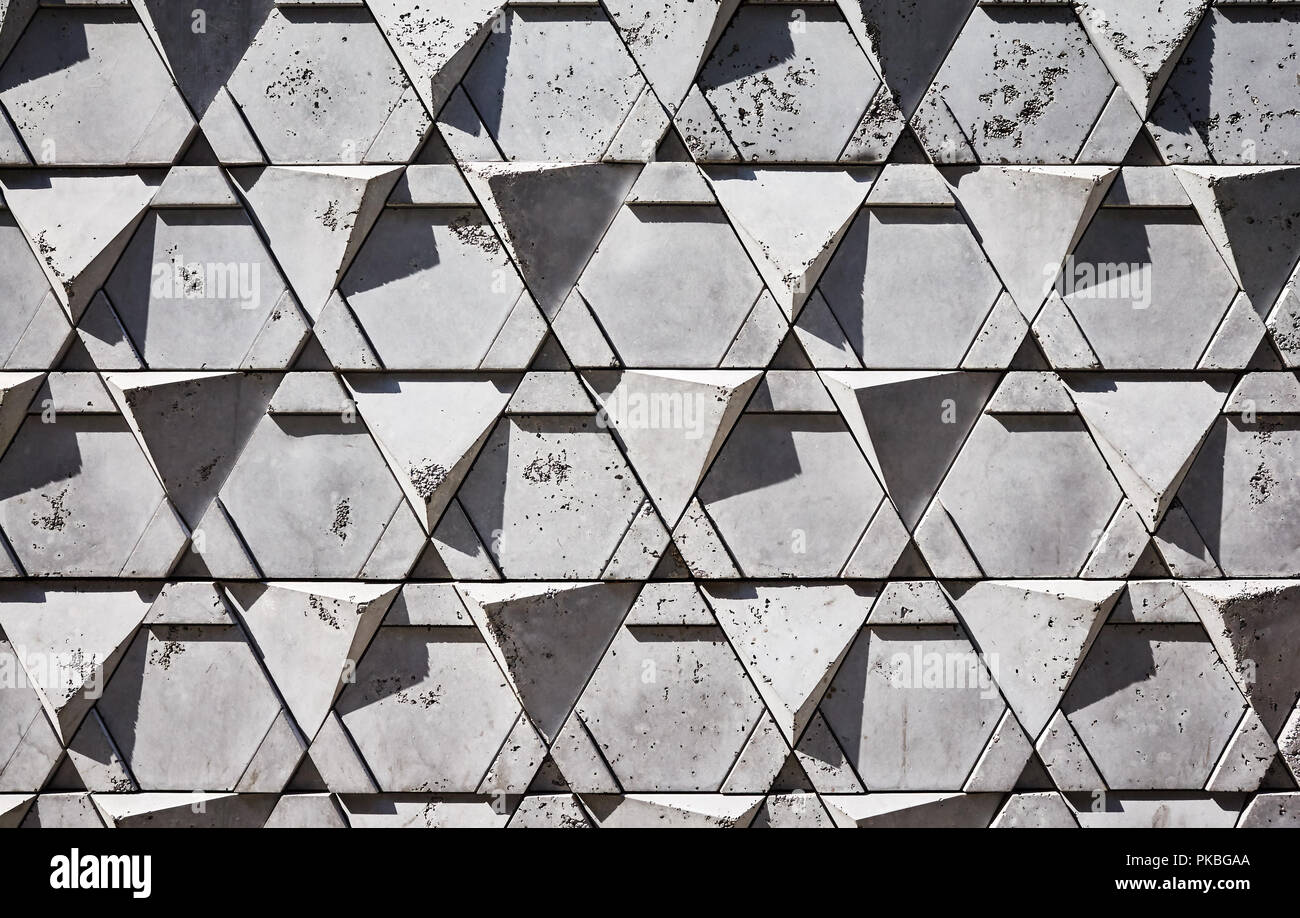 Triangular shape bricks wall background or texture Stock Photo - Alamy