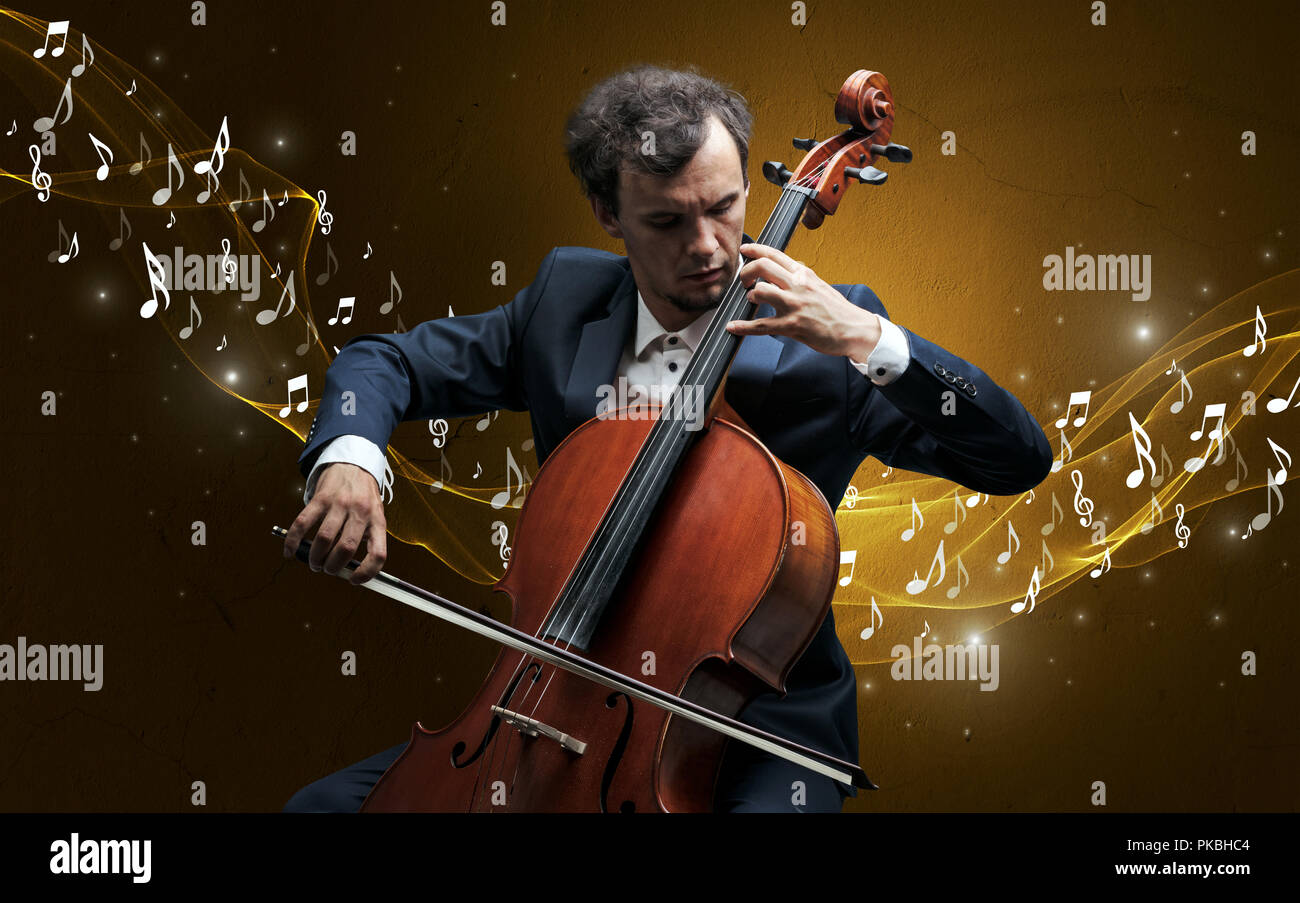 Lonely musical composer with cello and sparkling musical notes around ...