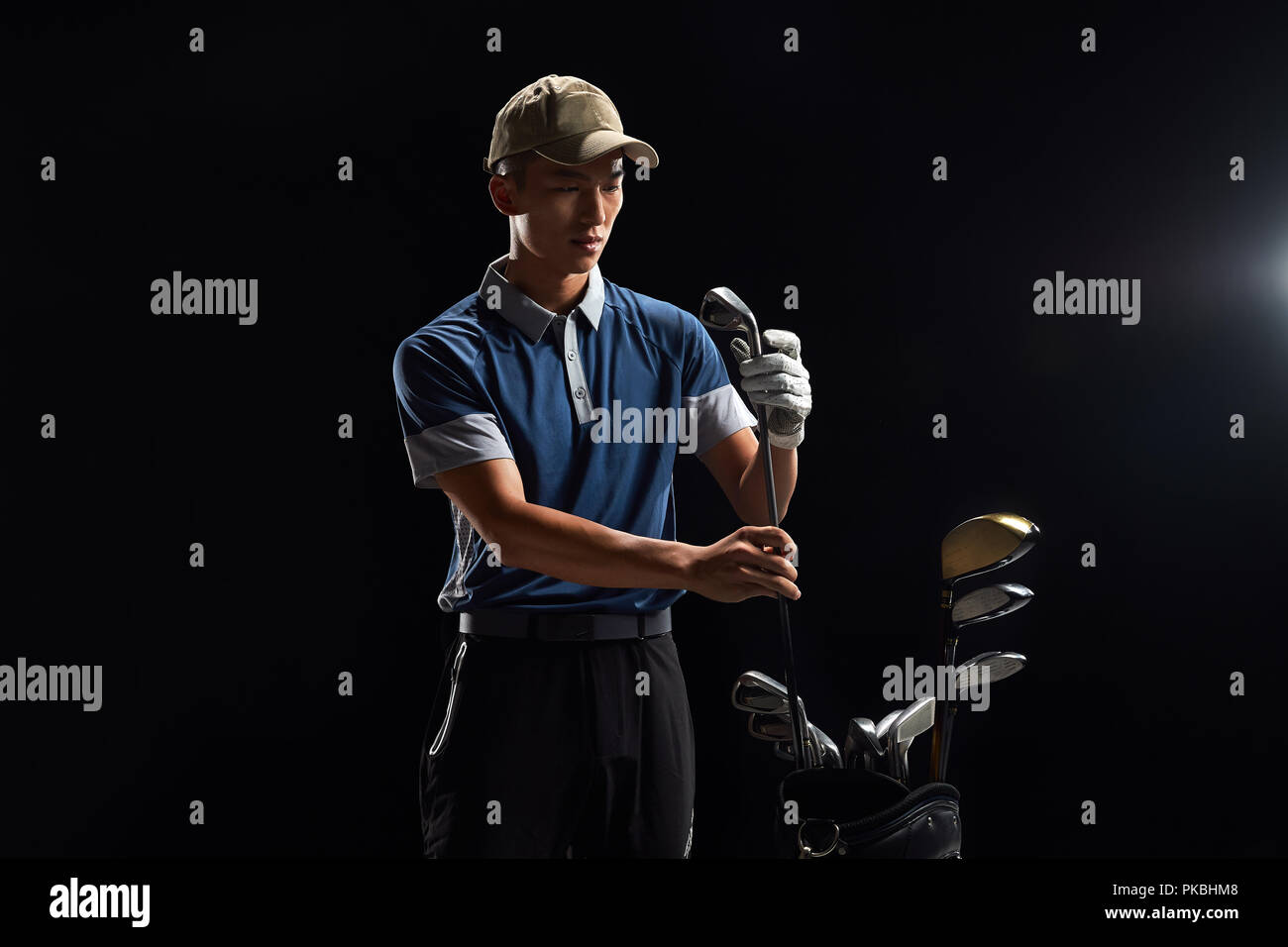 Asian chinese man holding golf hi-res stock photography and images - Alamy