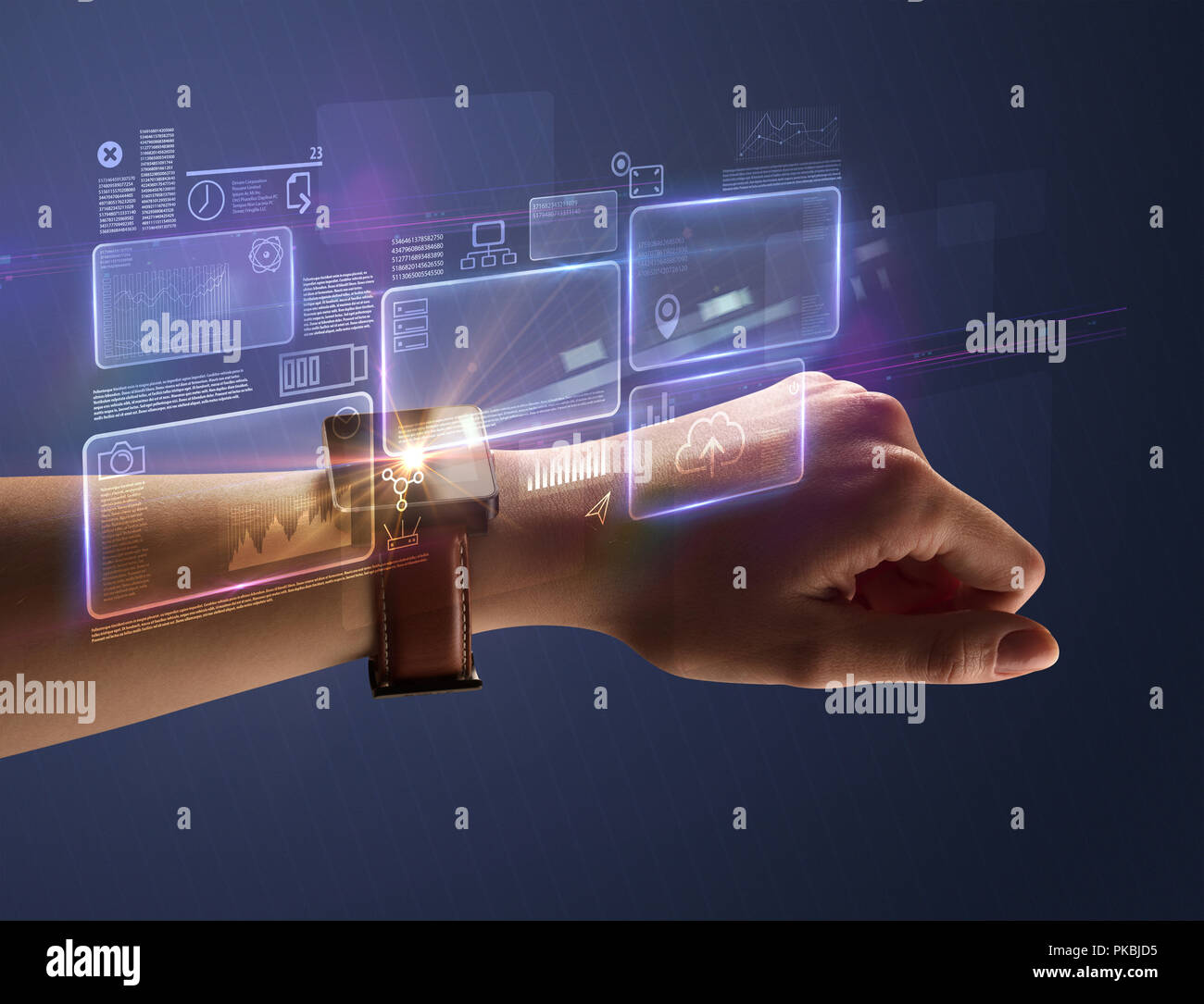 Female hand wearing smartwatch with statement labels around and dark ...