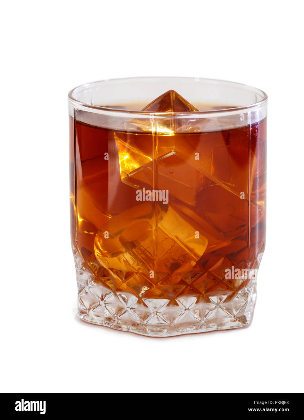 A glass of whiskey with ice cubes on a white background Stock Photo - Alamy