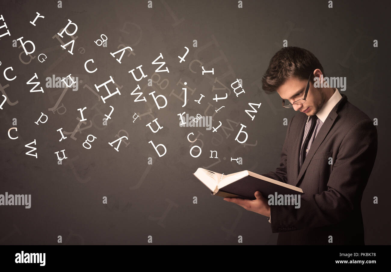 Open book flying alphabet hi-res stock photography and images - Alamy