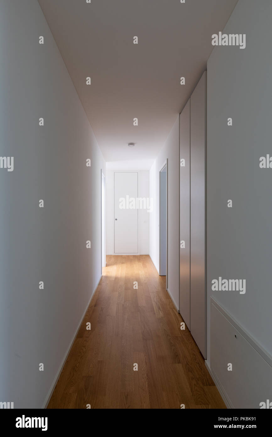 Long corridor in a modern apartment Stock Photo - Alamy