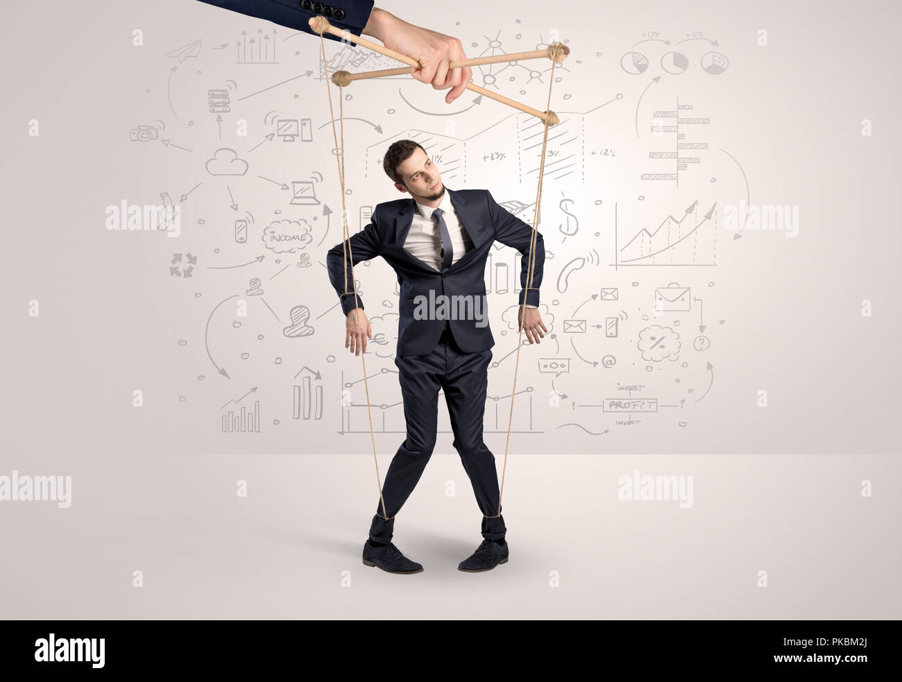 Little businessman controlled from above like a puppet concept Stock ...