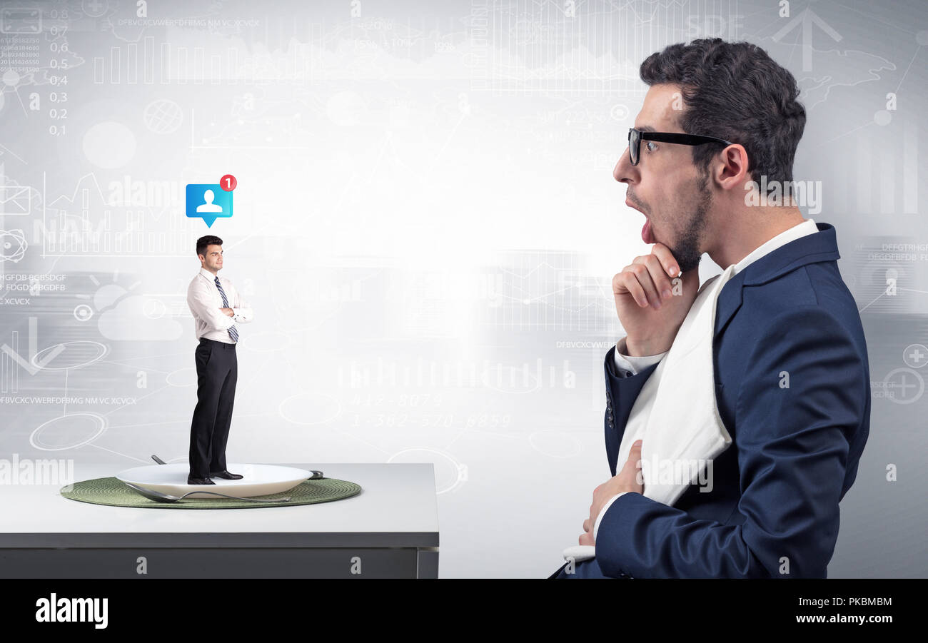 Giant businessman eating small man with financial background Stock ...