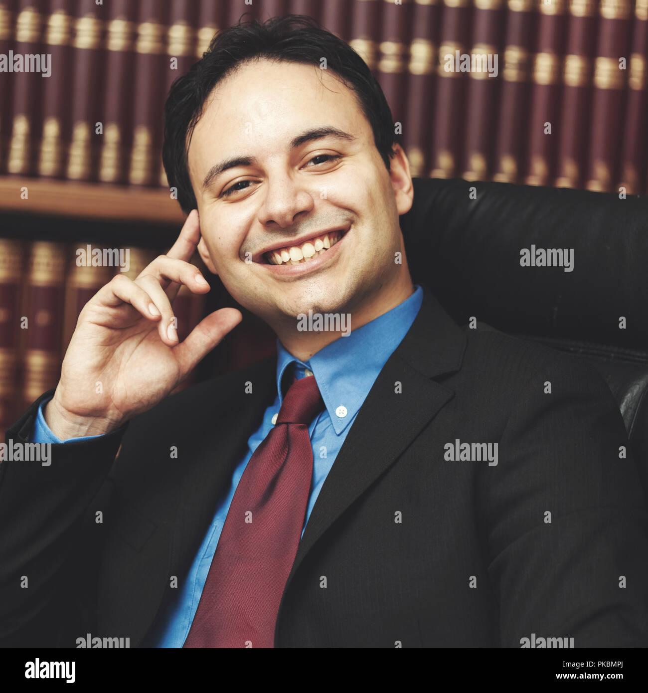 Successful lawyer portrait in his studio Stock Photo - Alamy