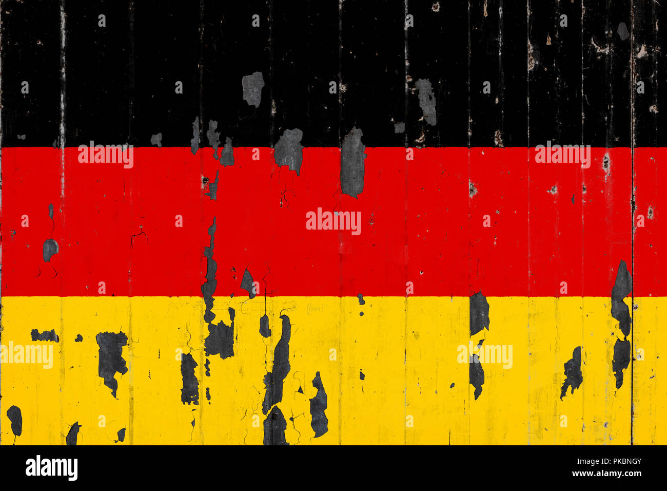 National flag of Germany on the background of an old mettale covered ...