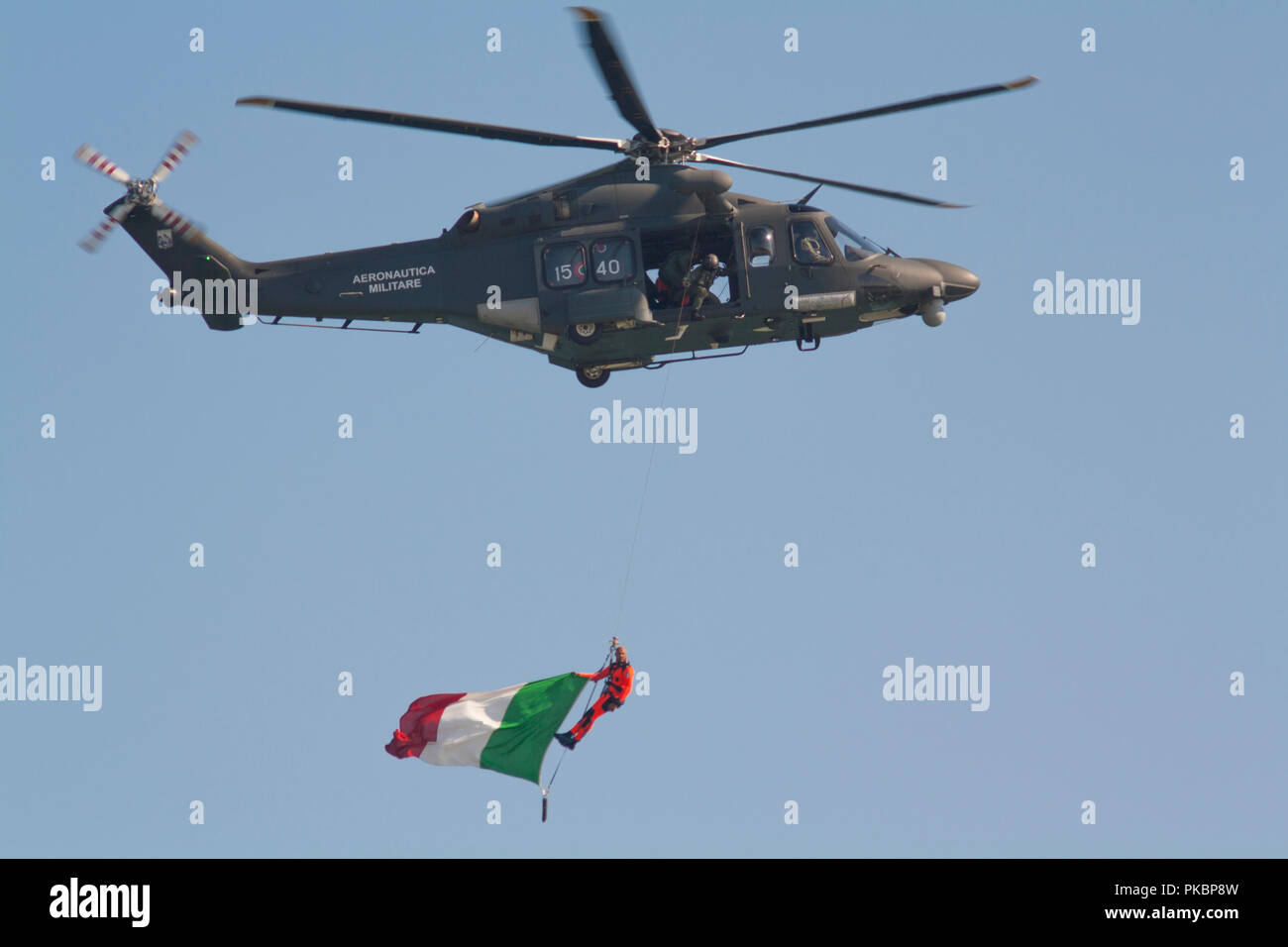 Helicopter flying with Italian flag at an airshow Stock Photo - Alamy