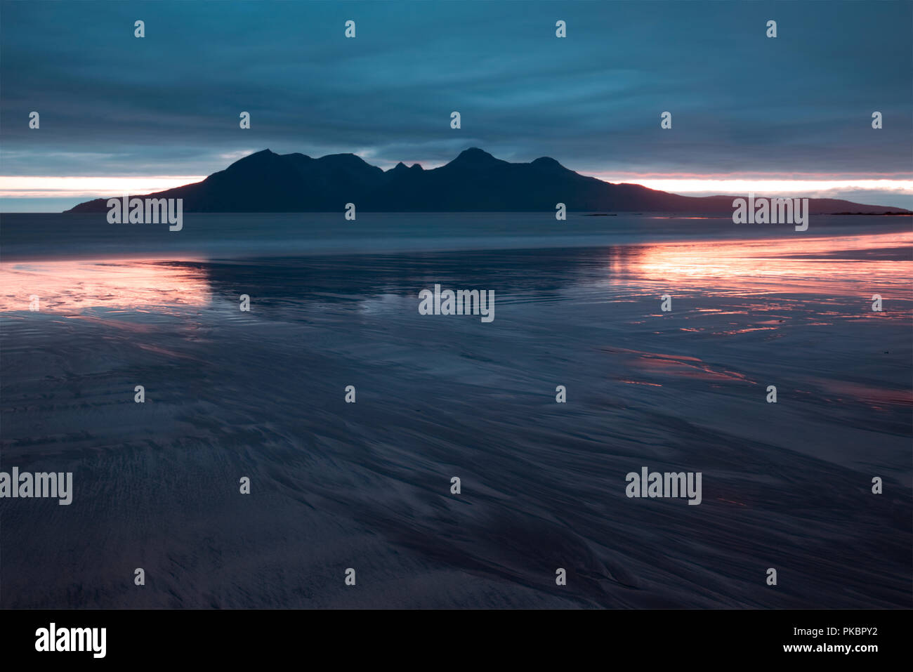 View towards Isle of Rum from Laig beach,Isle of Eigg Stock Photo - Alamy