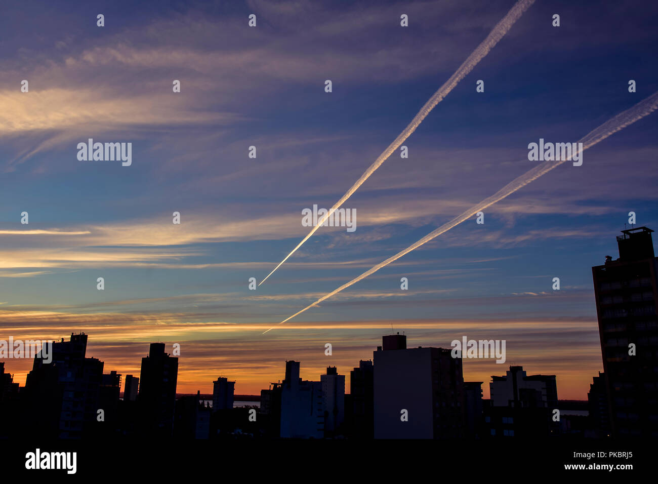 Sunset in the city Stock Photo - Alamy