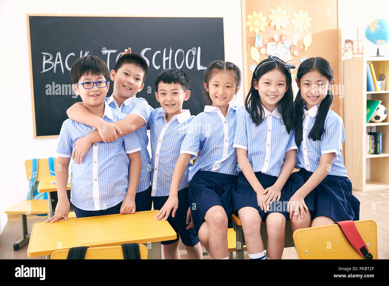 Lovely students in the classroom Stock Photo - Alamy