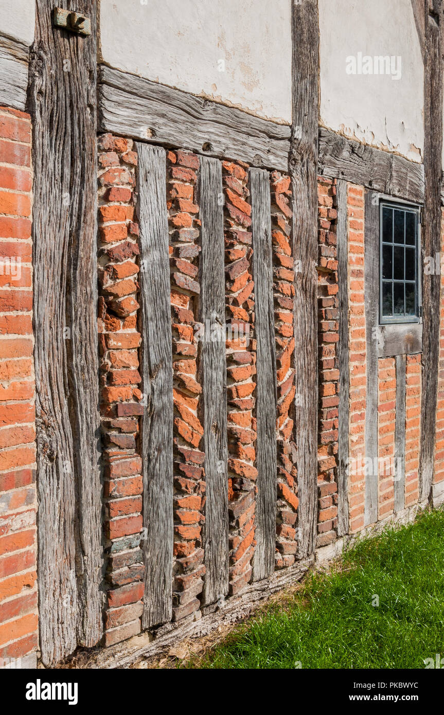 The external of a tudor house and its bricks and wooden beams in ...