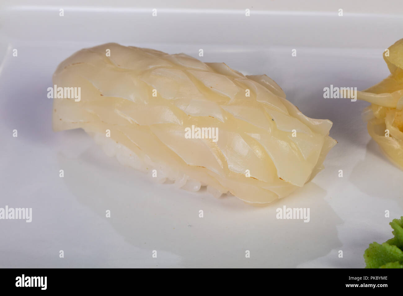 Japanese cold sushi with squid Stock Photo - Alamy