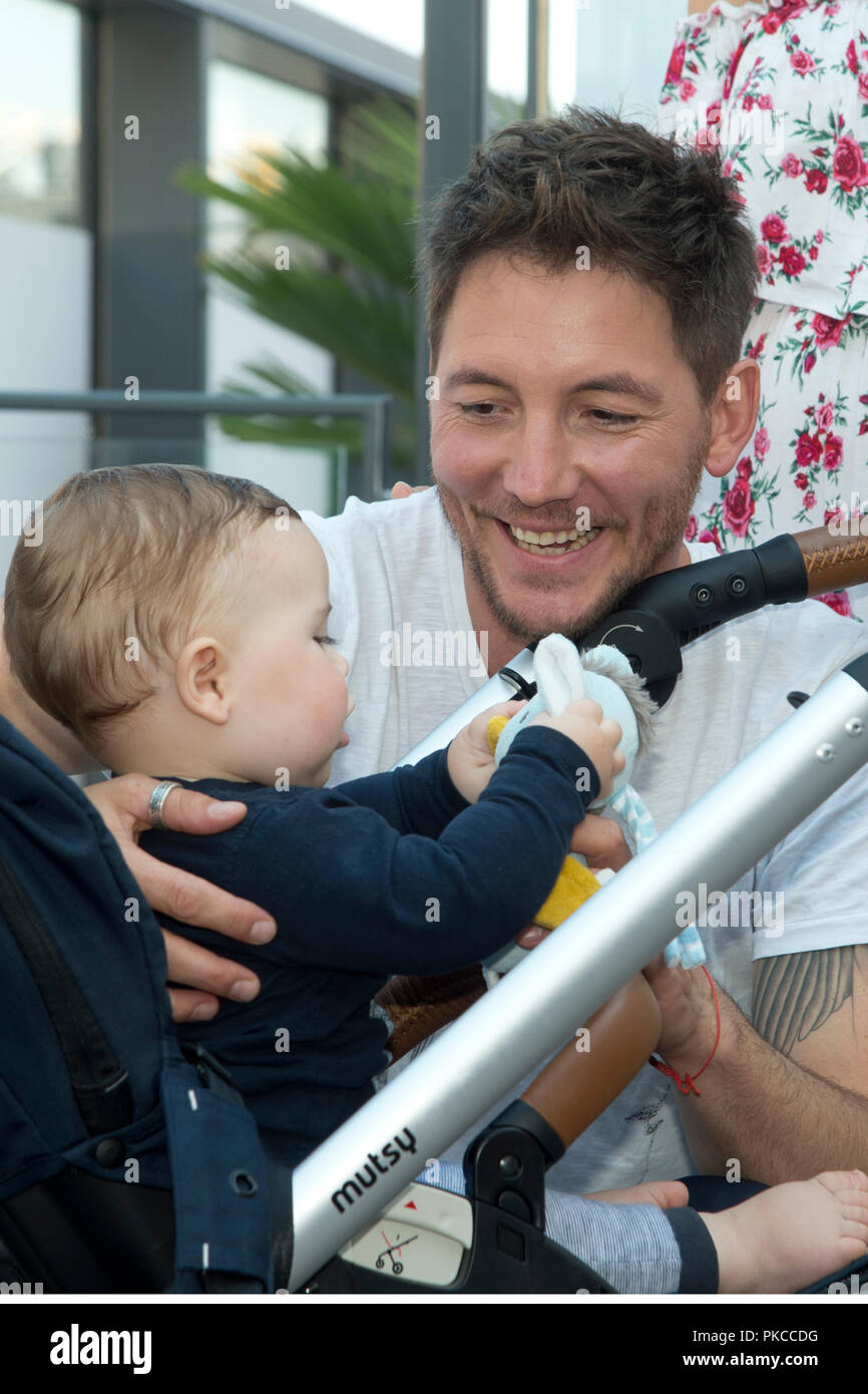 Dirk MORITZ, actor, and his baby Nio Pepe, the pair of actors is in ...