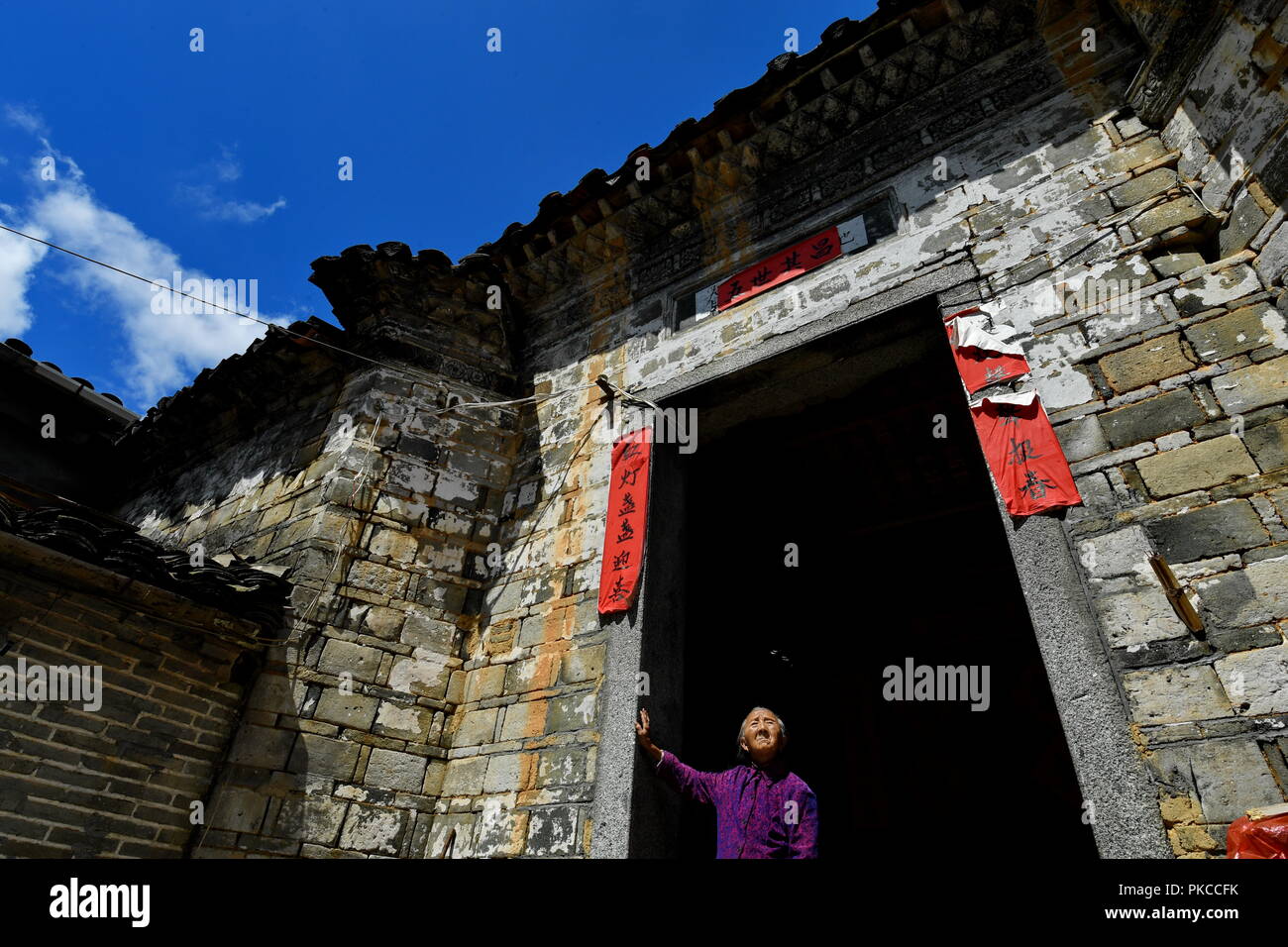 Shaowu. 12th Sep, 2018. A villager is seen at a traditional house in ...