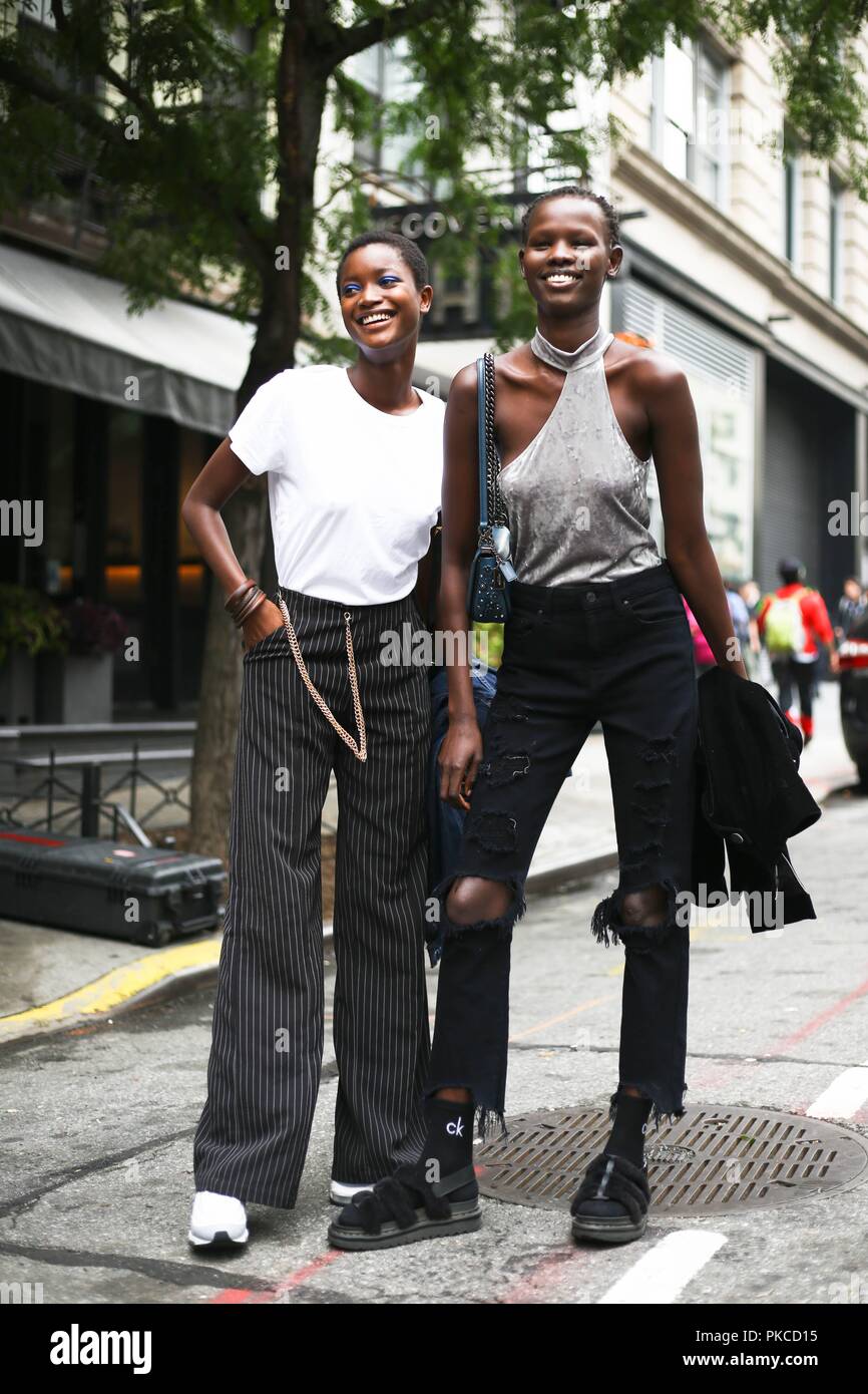 Models posing on the street during New York Fashion Week - Sept 11 ...