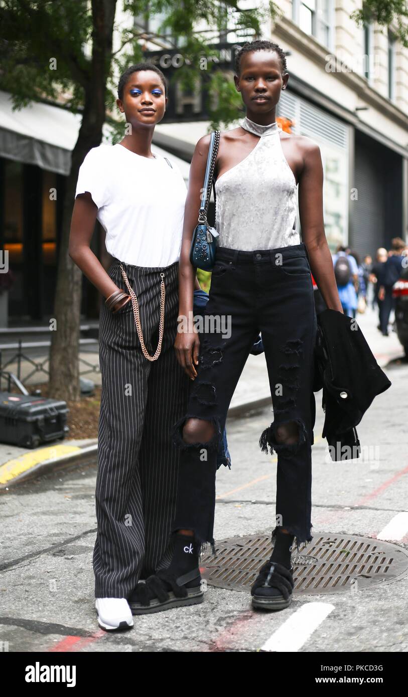 Models posing on the street during New York Fashion Week - Sept 11 ...