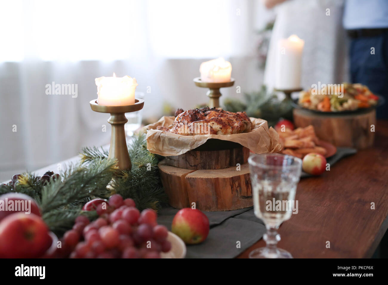 Christmas Day. Celebration dinner with group of friends Stock Photo - Alamy