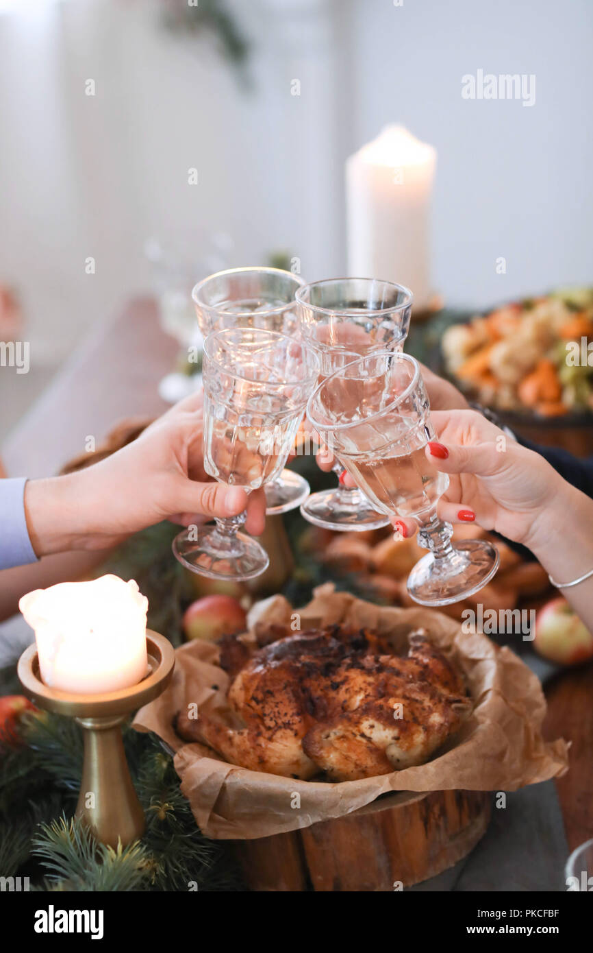 Christmas Day. Celebration dinner with group of friends Stock Photo - Alamy