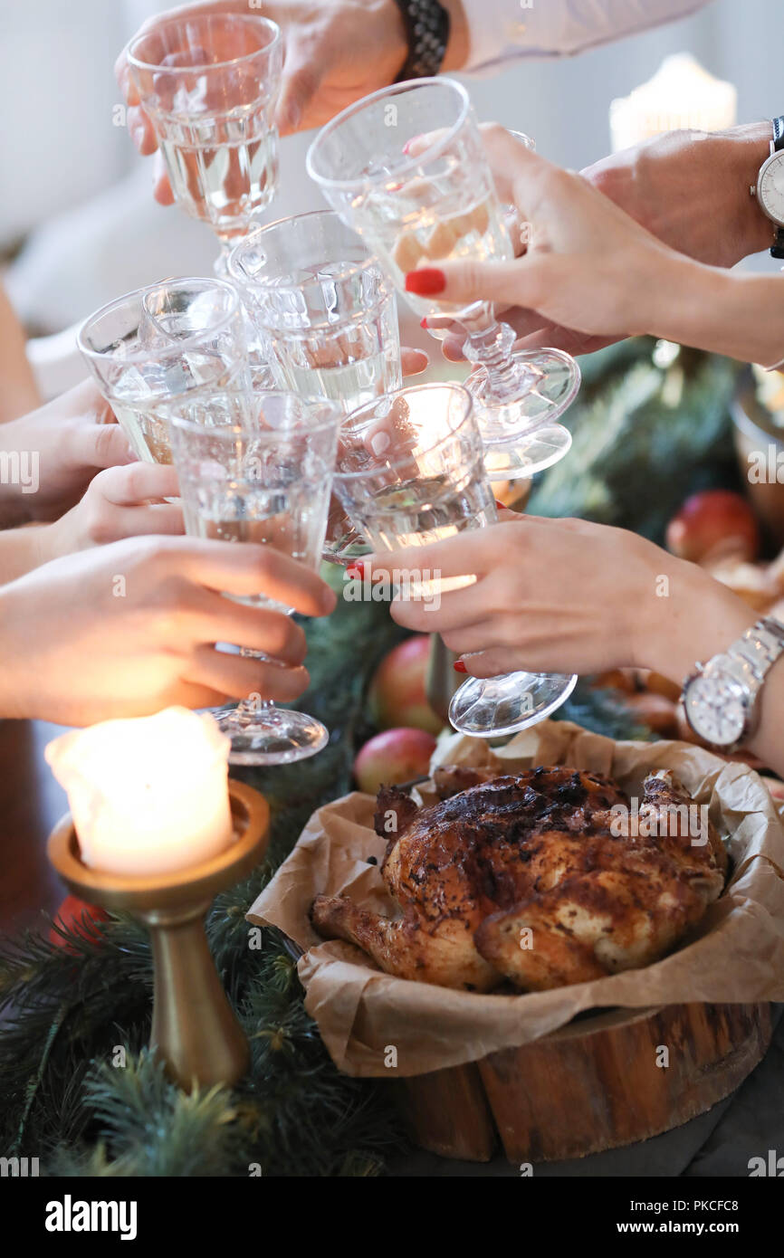 Christmas Day. Celebration dinner with group of friends Stock Photo - Alamy