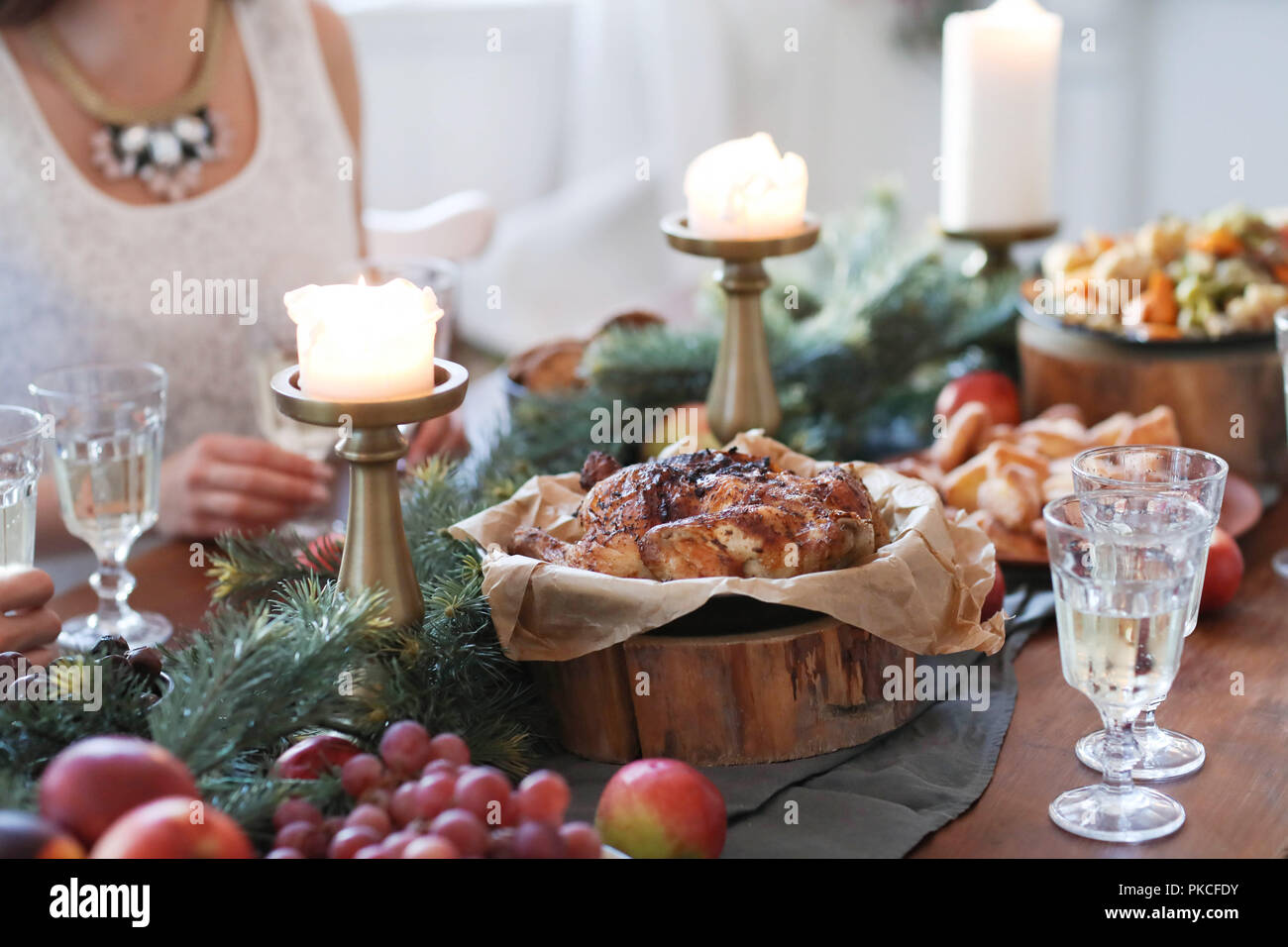 Christmas Day. Celebration dinner with group of friends Stock Photo - Alamy