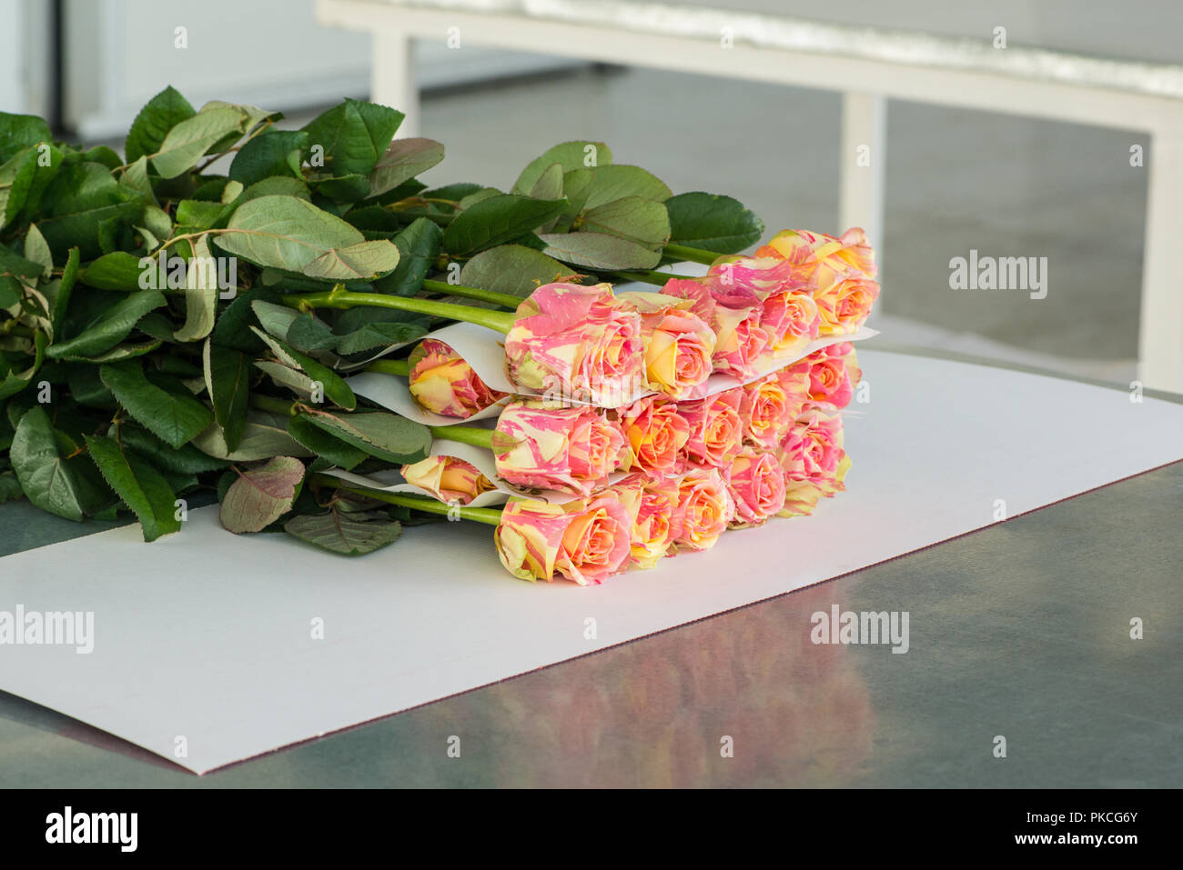 the process of packing flowers with paper, preparation for ...
