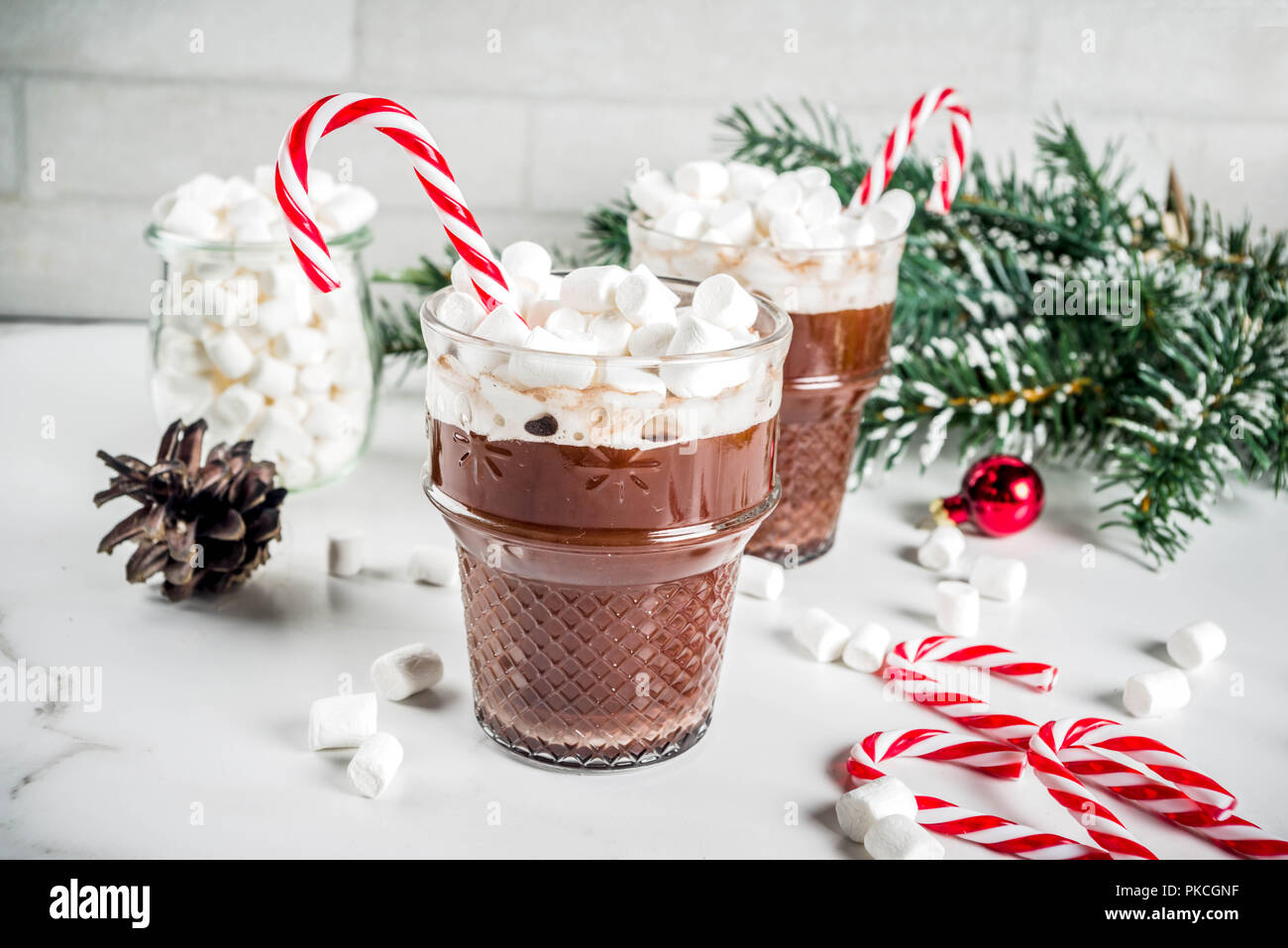 Peppermint hot chocolate with marshmallow and candy cane sweets in ...