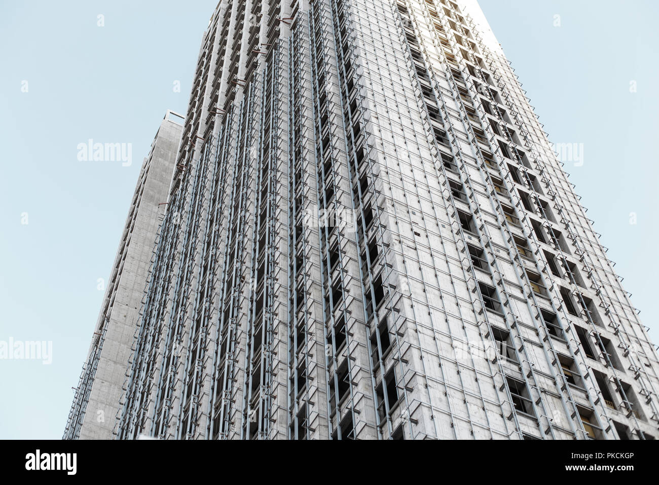 Unfinished skyscraper. Construction of the building Stock Photo - Alamy