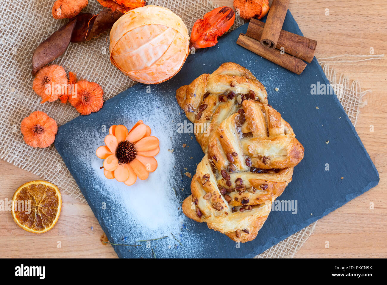 marple and pecan plait pastry sweet food breakfast with flower Stock ...