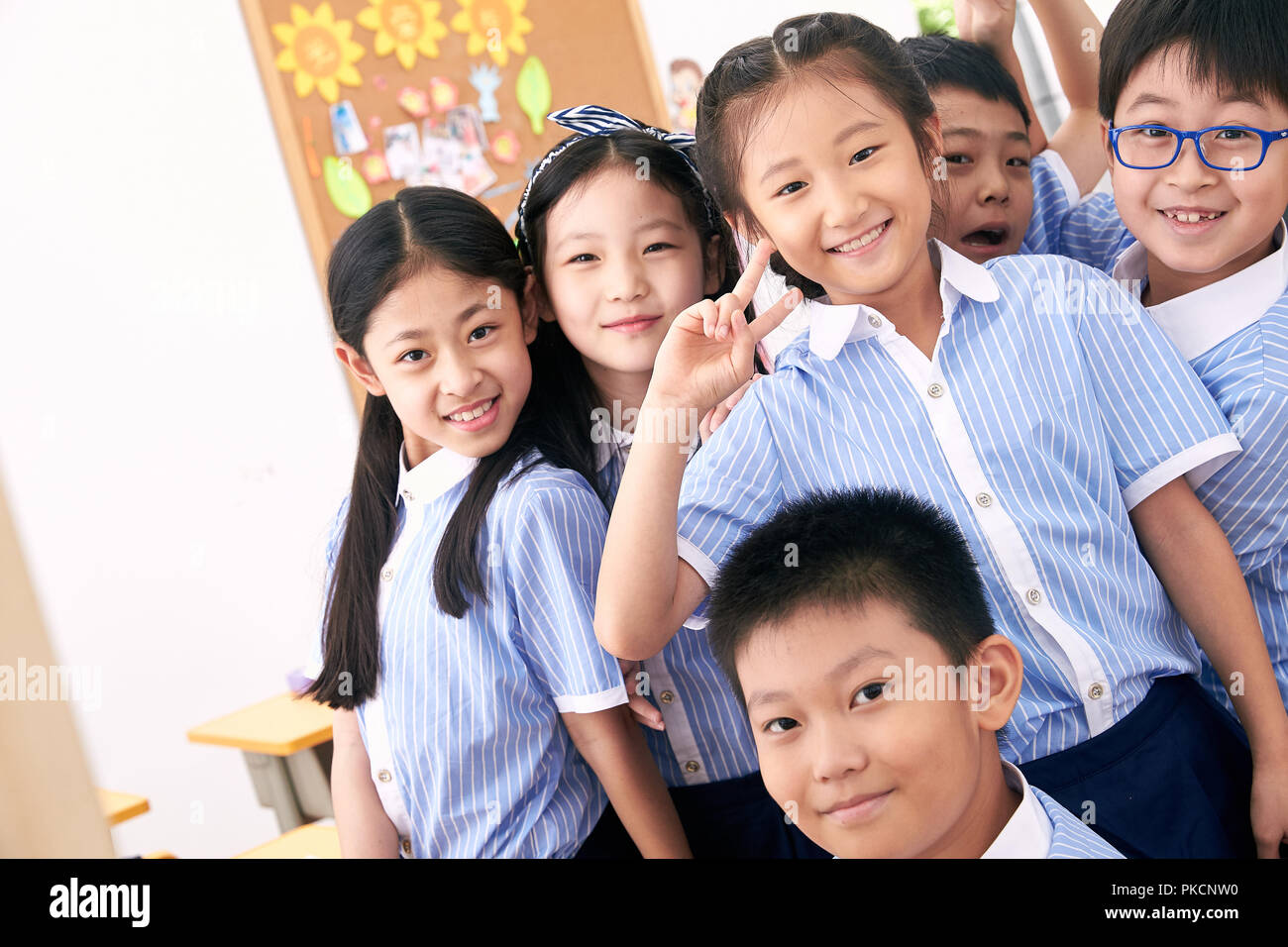 Lovely students in the classroom Stock Photo - Alamy