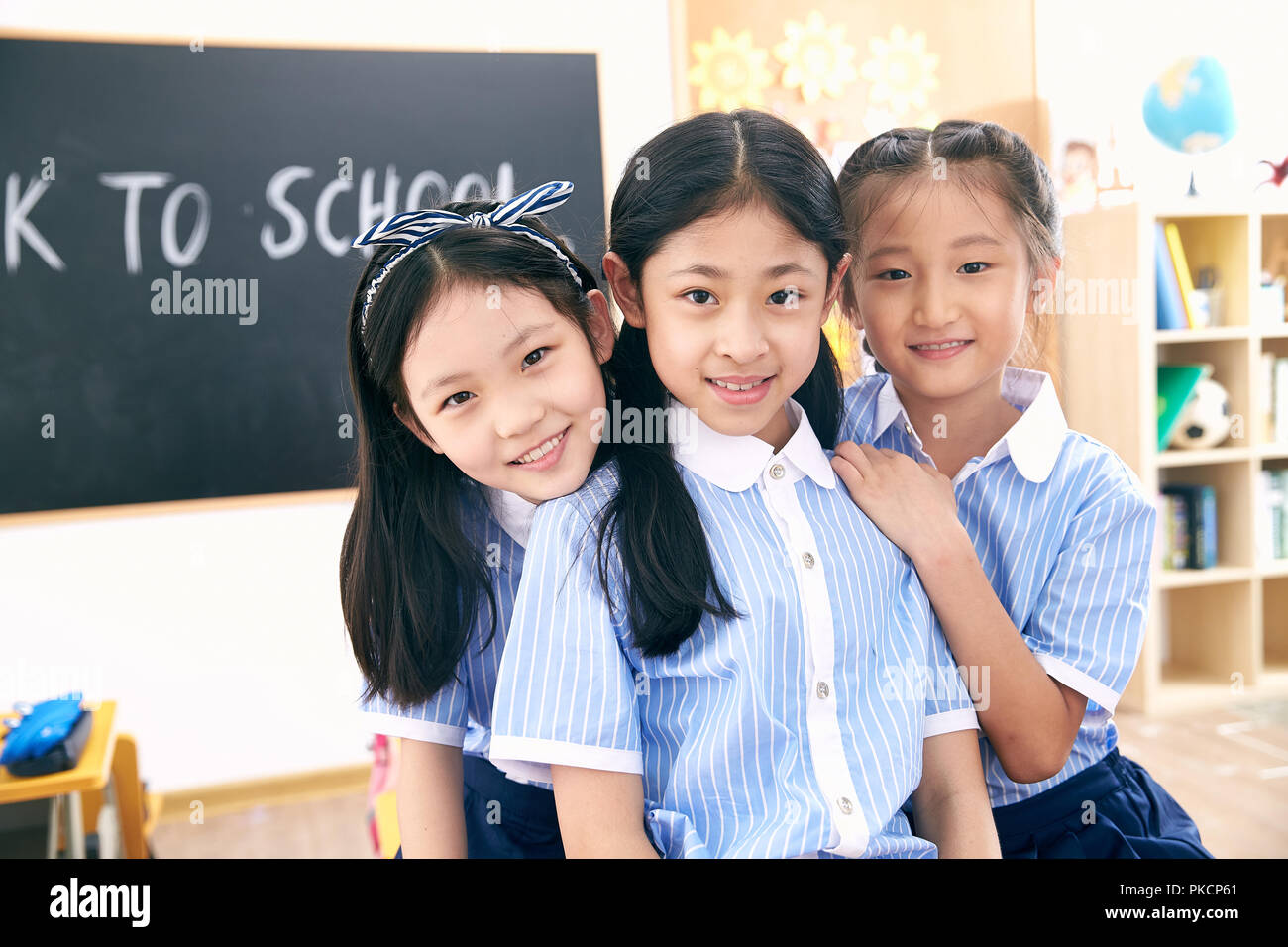 Cute little girls in the classroom Stock Photo - Alamy