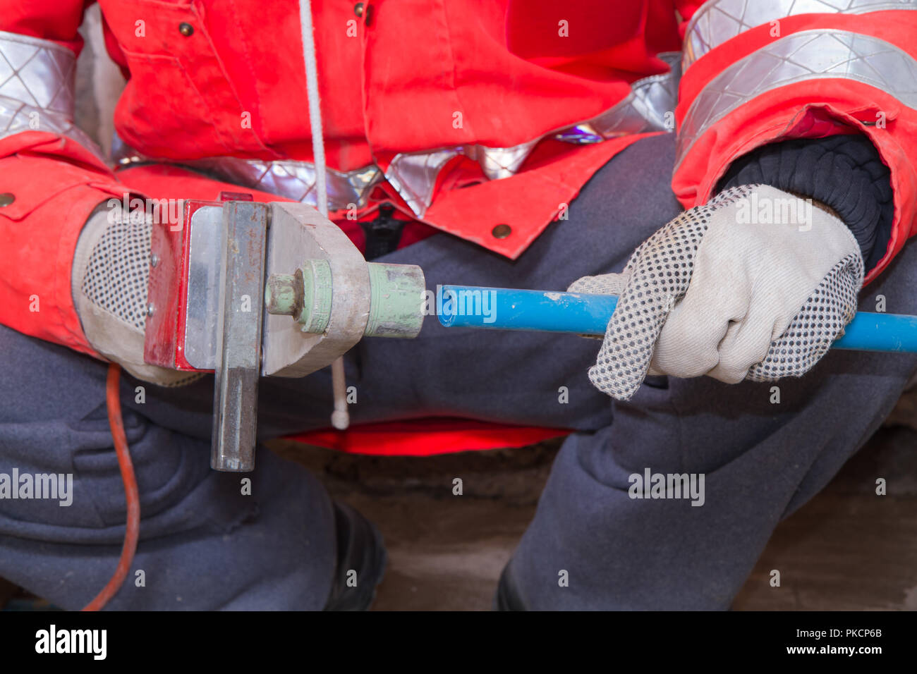 plumber at work with pipes Stock Photo - Alamy
