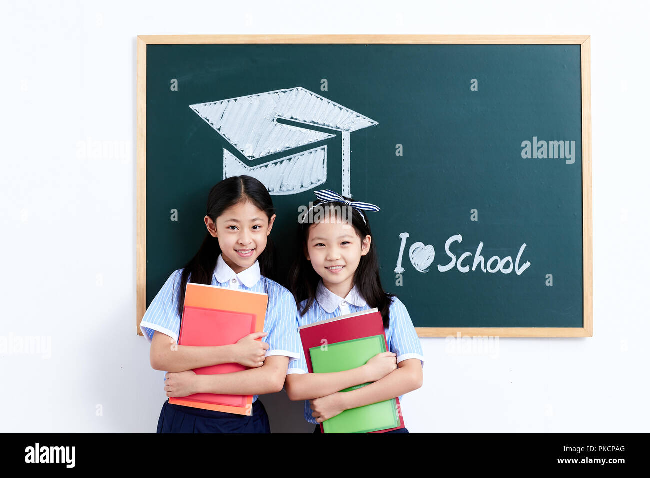 Cute little girls in the classroom Stock Photo - Alamy