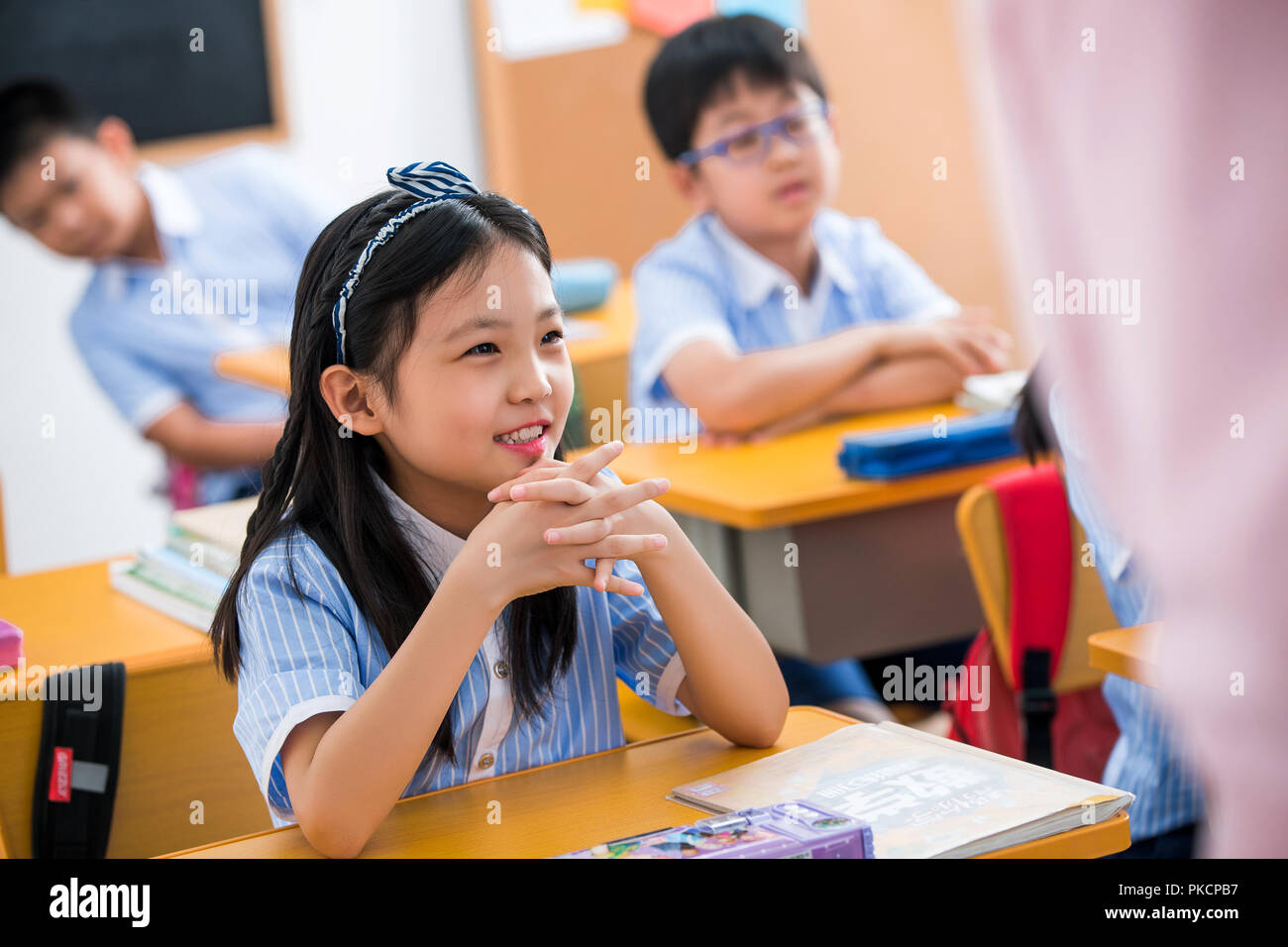 Elementary school students in the classroom Stock Photo - Alamy