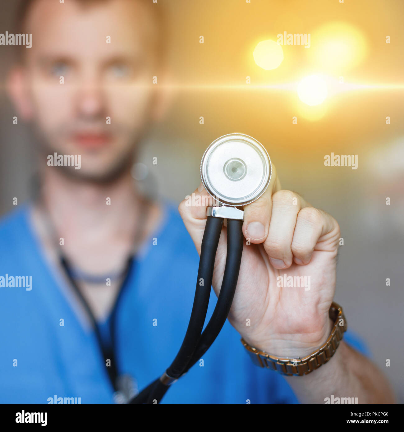 Doctor checks the health of the patient. Stethoscope in hand Stock ...