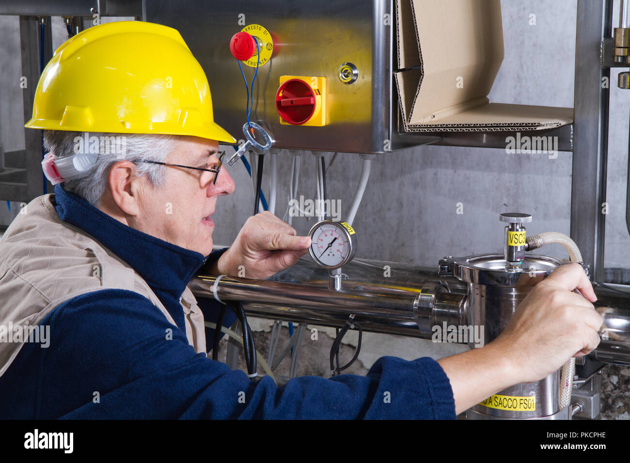 repairman at maintenance work Stock Photo - Alamy
