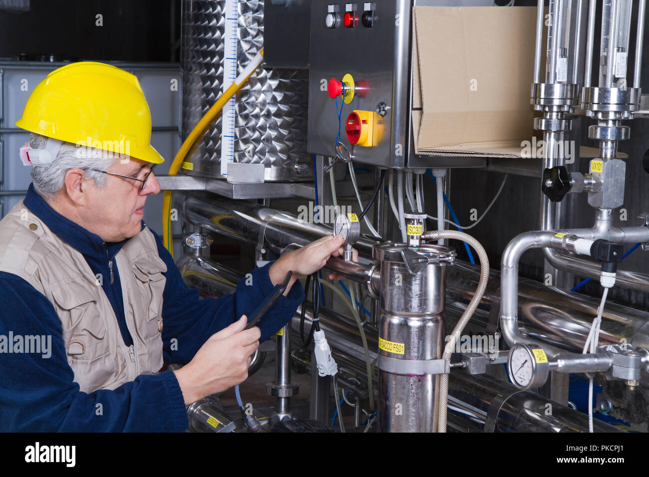 repairman at maintenance work Stock Photo - Alamy